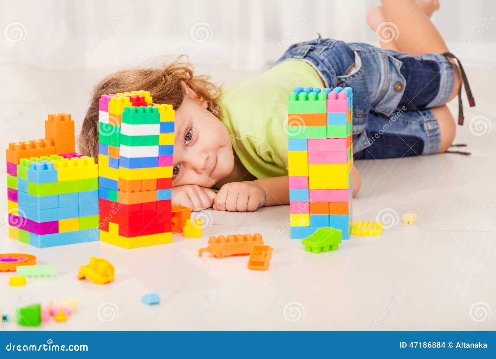 Little Boy Playing Lego on the Floor Stock Photo - Image of house ...