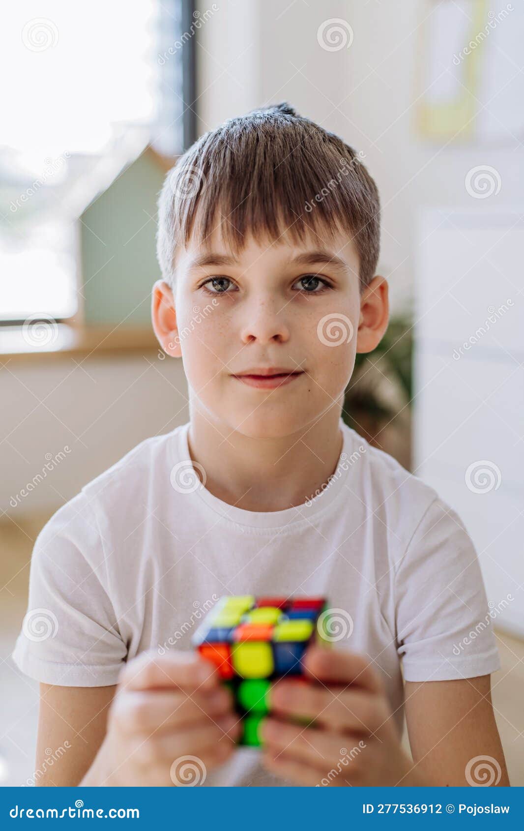 Little Boy Playing with Logic Cube in His Room. Editorial Photography ...