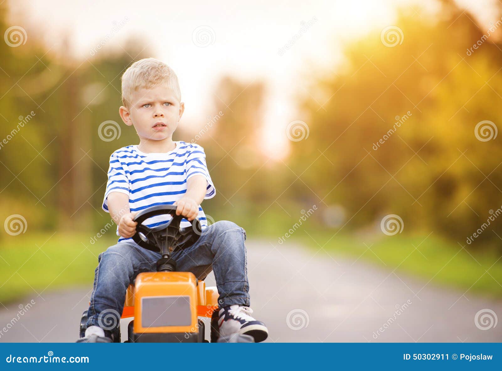 Little boy playing outside stock image. Image of beautiful - 50302911