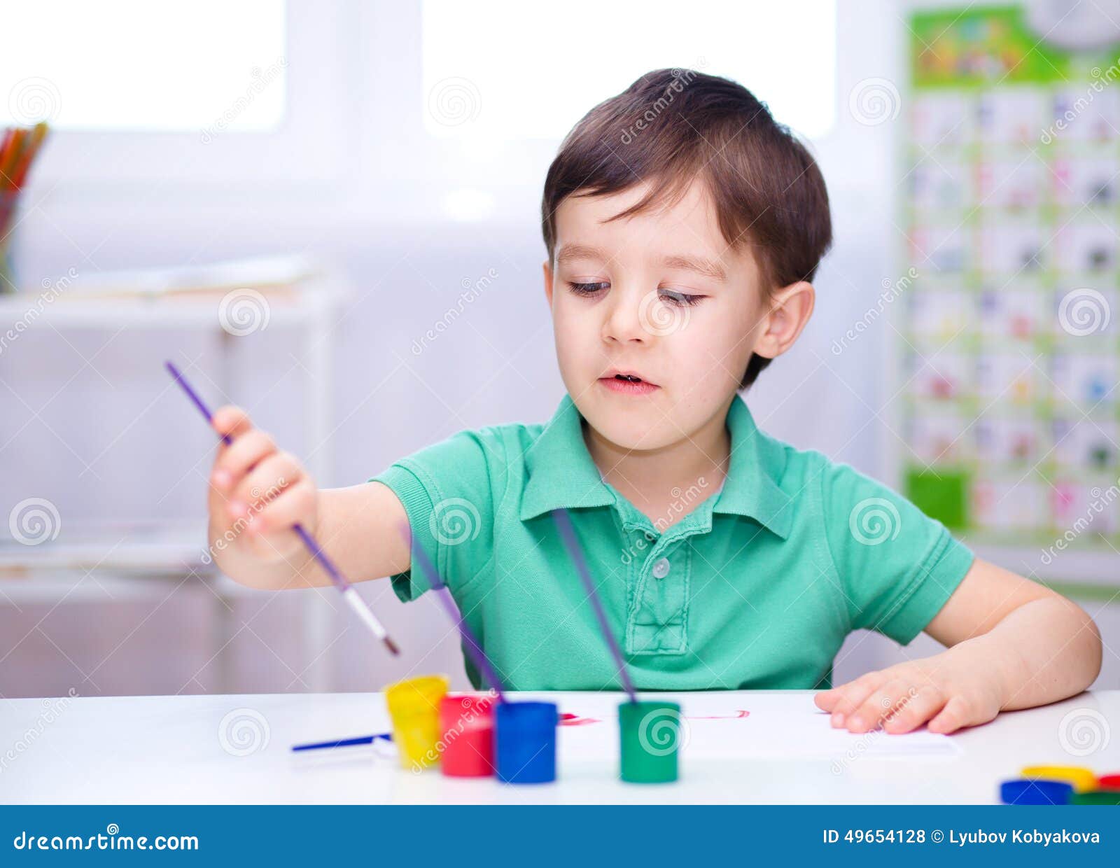 Little Boy Is Playing With Paints Stock Photo | CartoonDealer.com #49654128