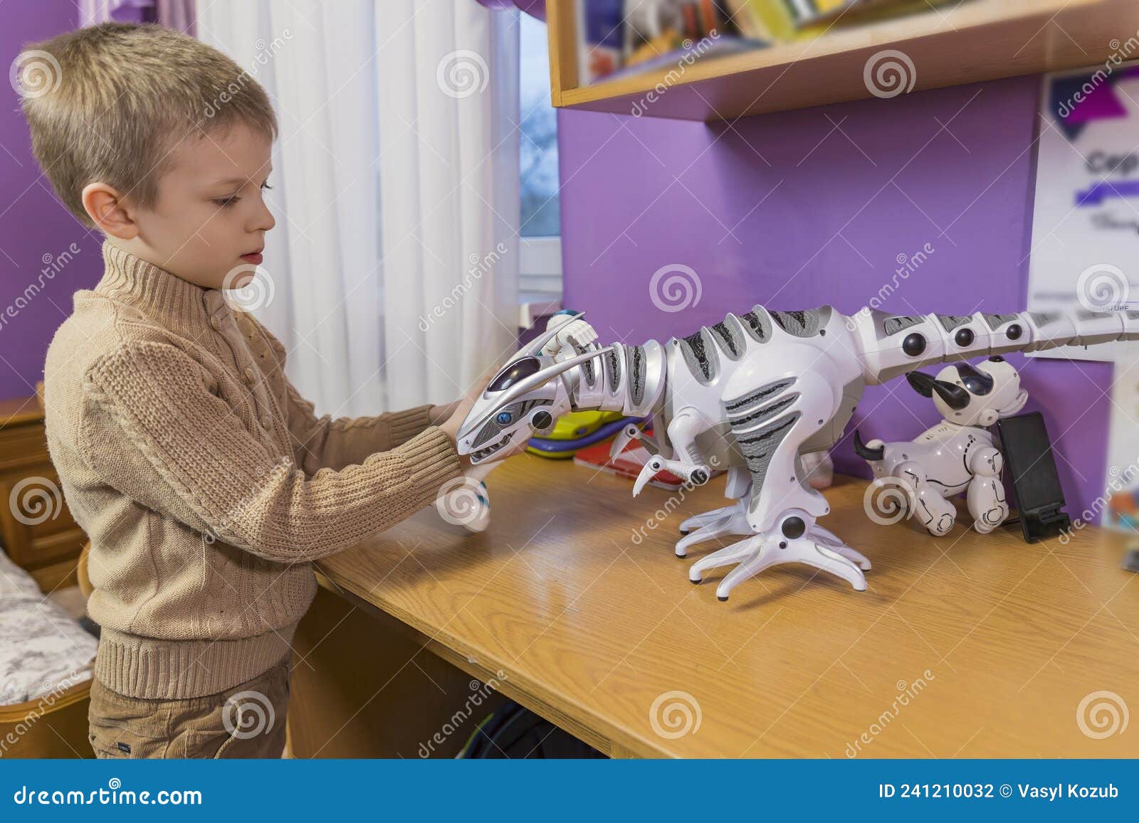 Little Boy Playing with Robots Stock Photo - Image of technology ...