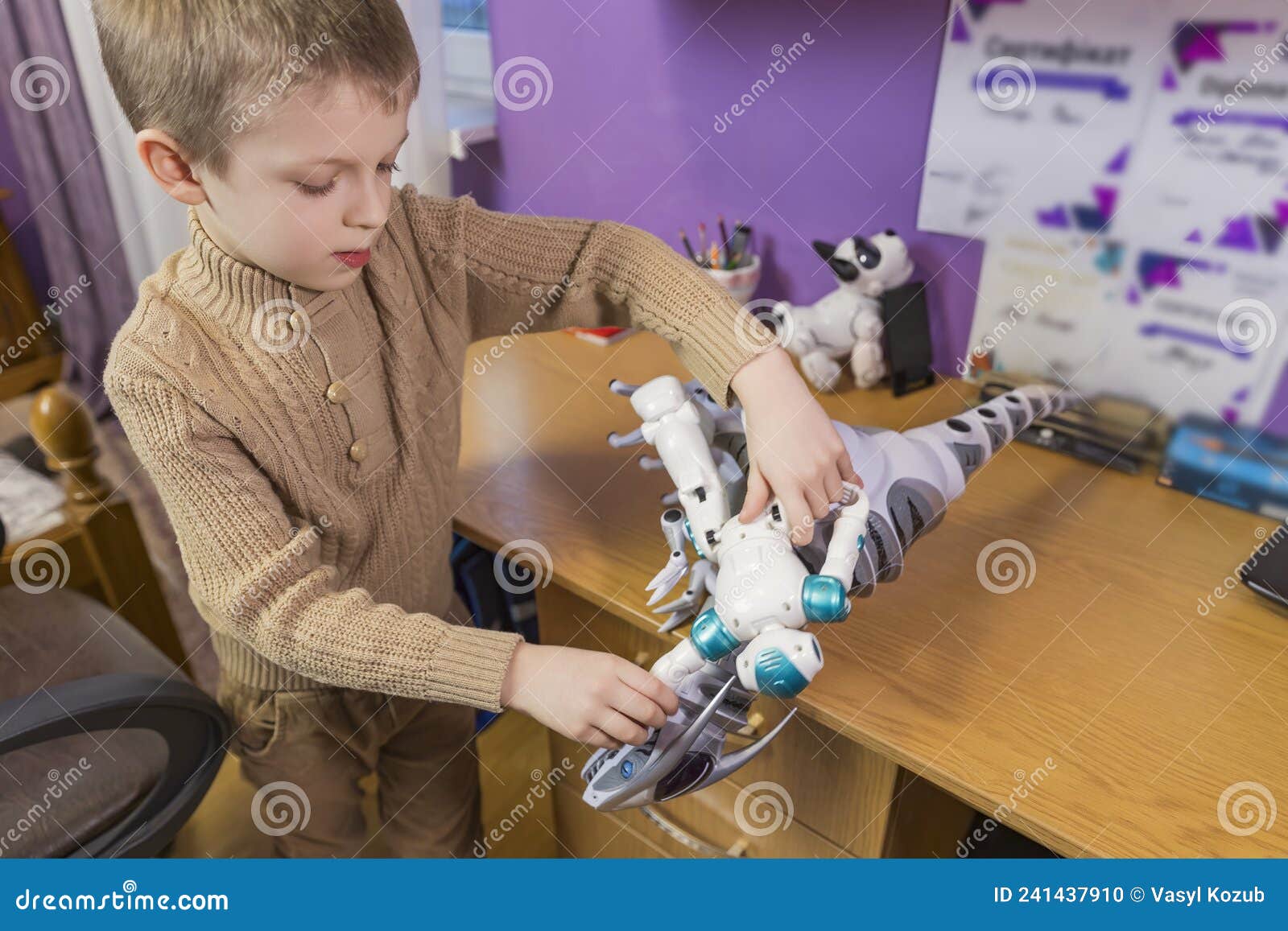 Little Boy Playing with Robots Stock Photo - Image of russia, childhood ...