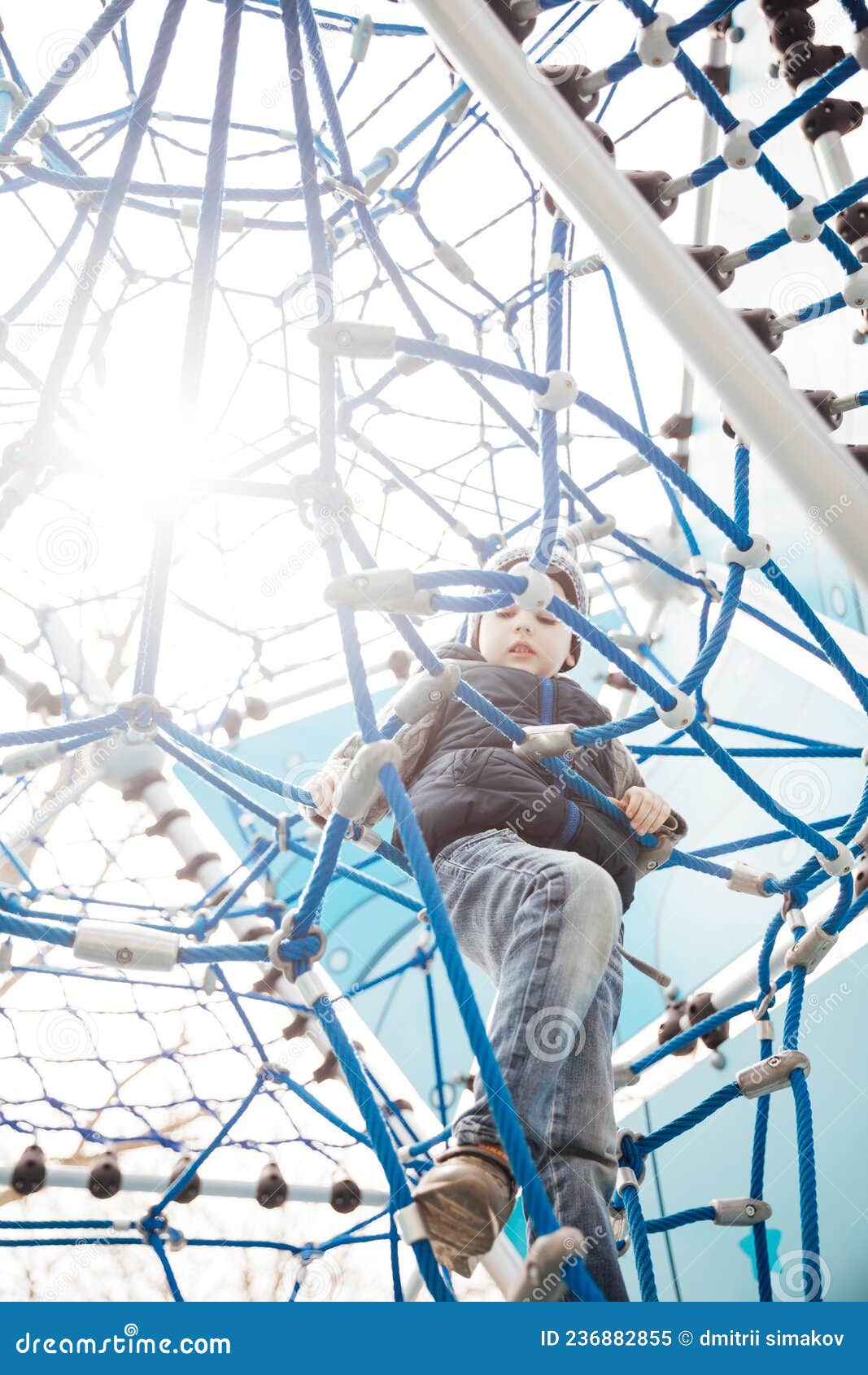 Beautiful Little Boy Playing in a Rope Maze Stock Image - Image of ...