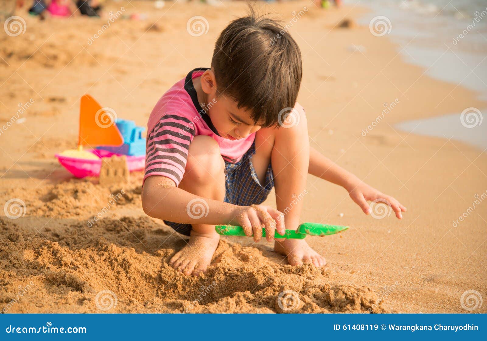 Little Boy Playing Sand on the Beach Summer Stock Image - Image of ...