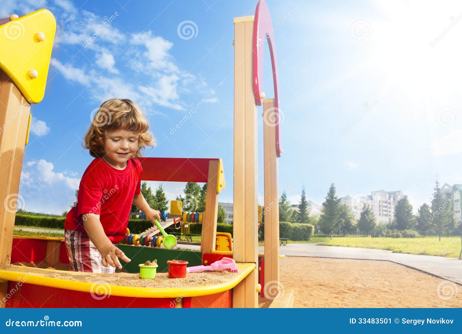 Little Boy Playing in Sandbox Stock Image - Image of joyful, sandpit ...