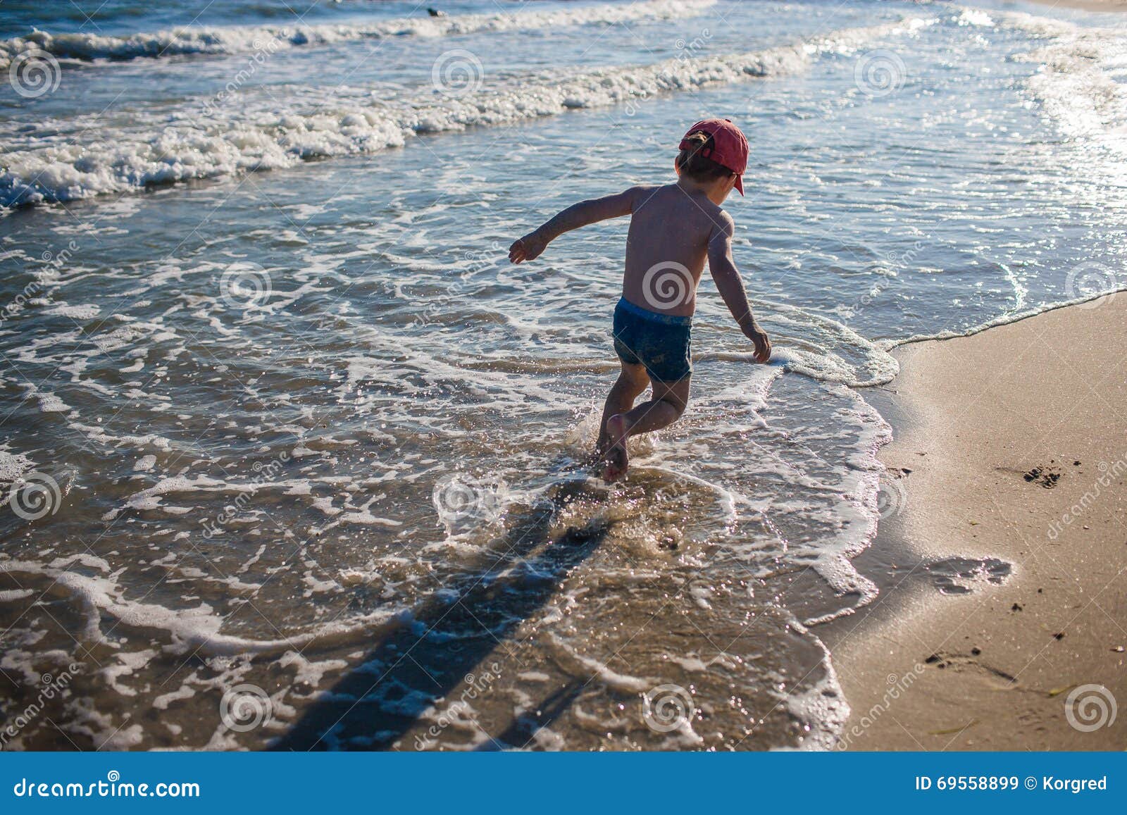 Little Boy Playing on the Seashore Stock Image - Image of child ...