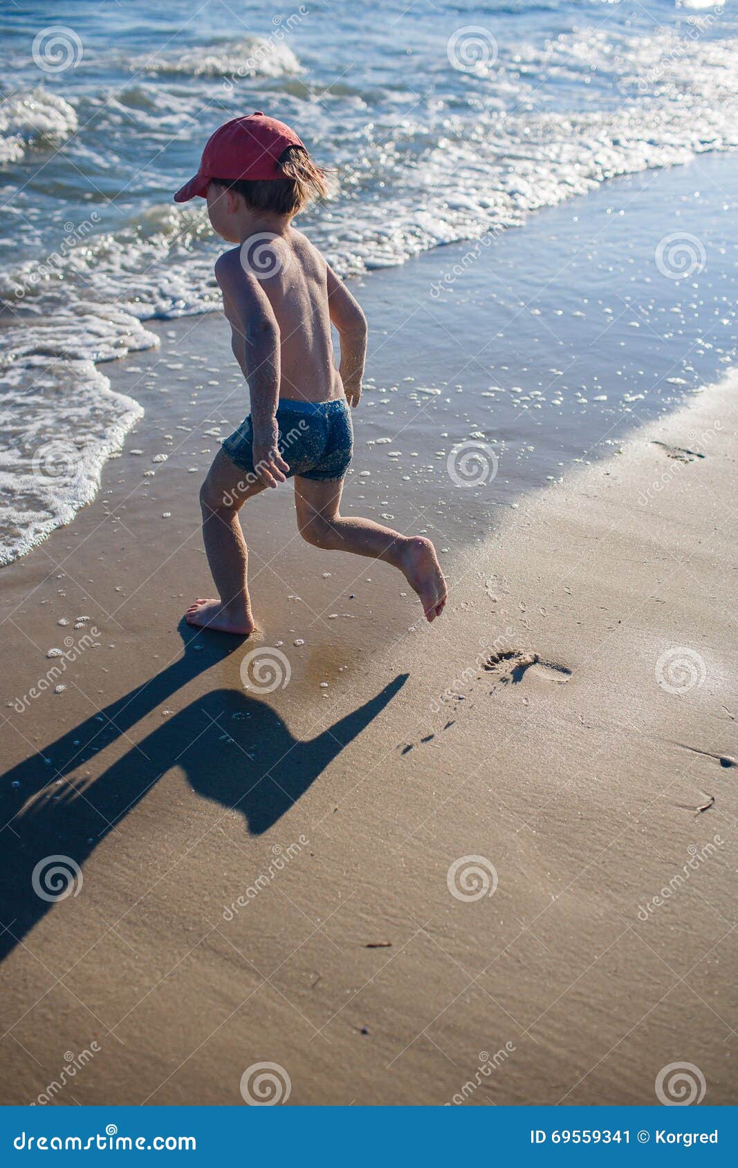 Little Boy Playing on the Seashore Stock Image - Image of beach, ocean ...
