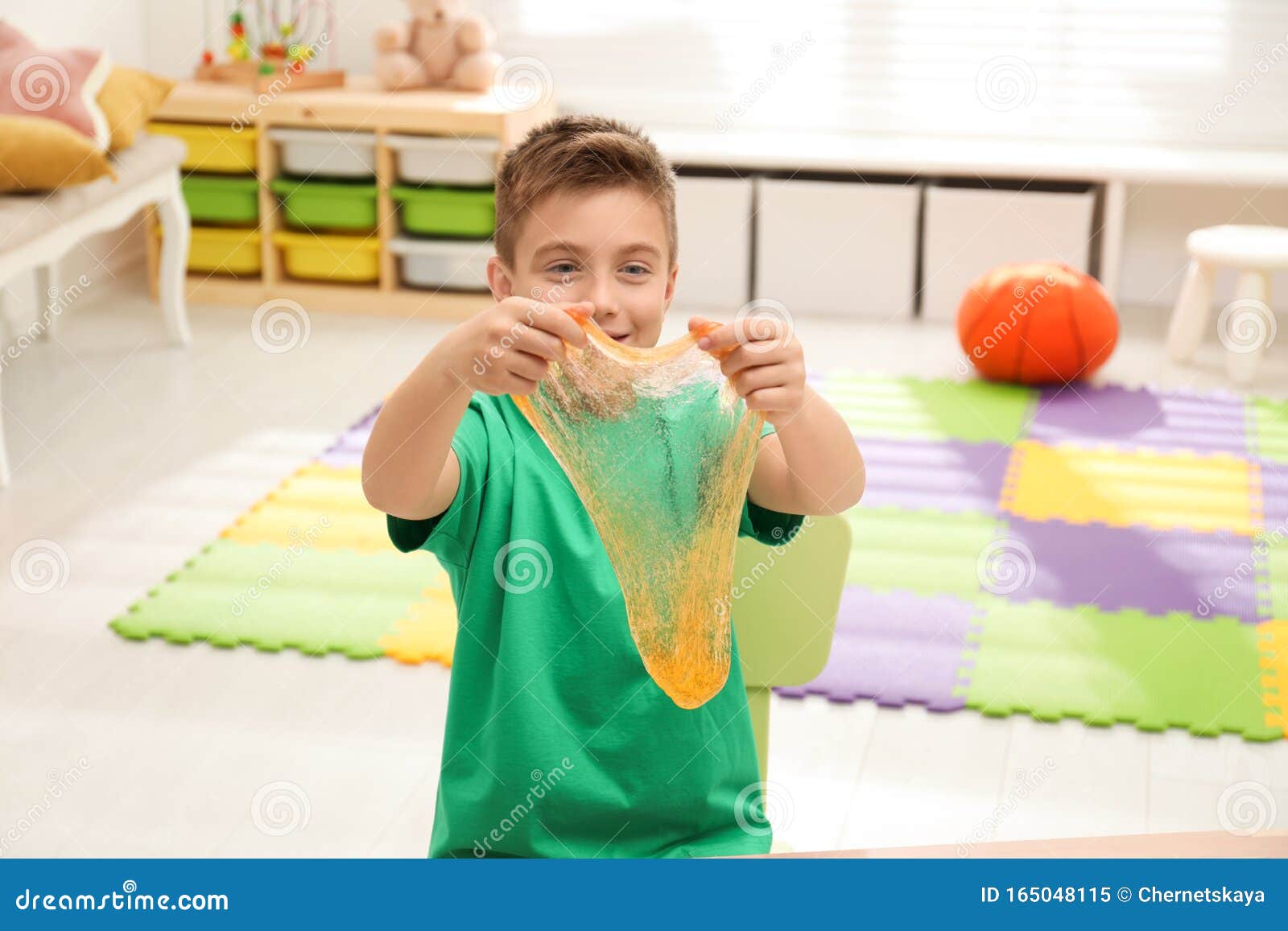 Little Boy Playing with Slime Stock Image - Image of indoors, fluffy ...
