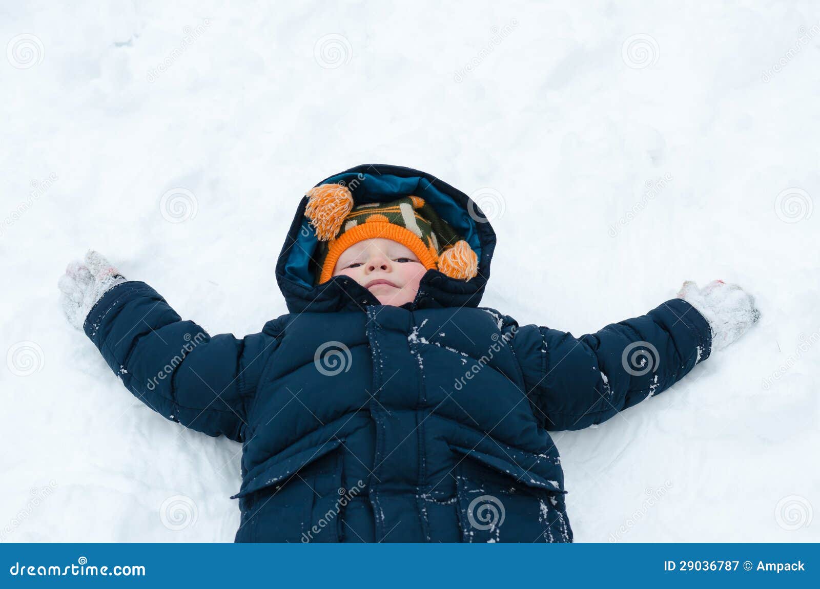 Little Boy Playing Snow Angels Stock Image - Image of vacation, cold ...