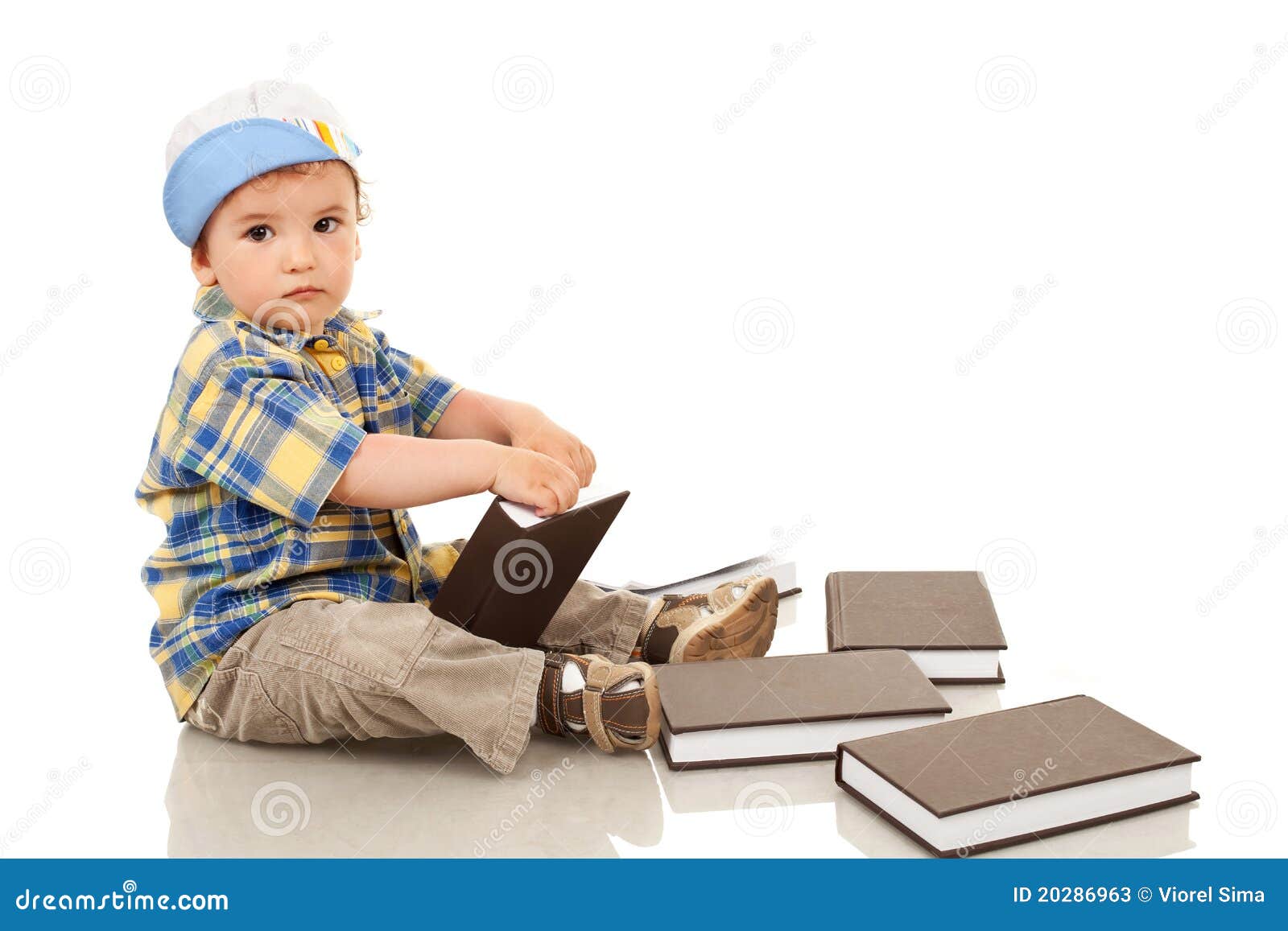 Little Boy Playing with Some Books Stock Image - Image of sitting ...