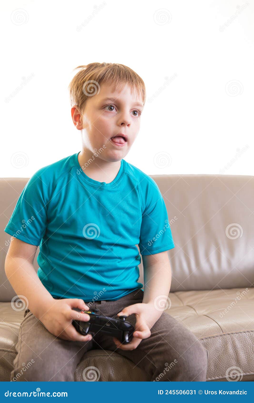 Boy playing video games stock image. Image of alone - 245506031