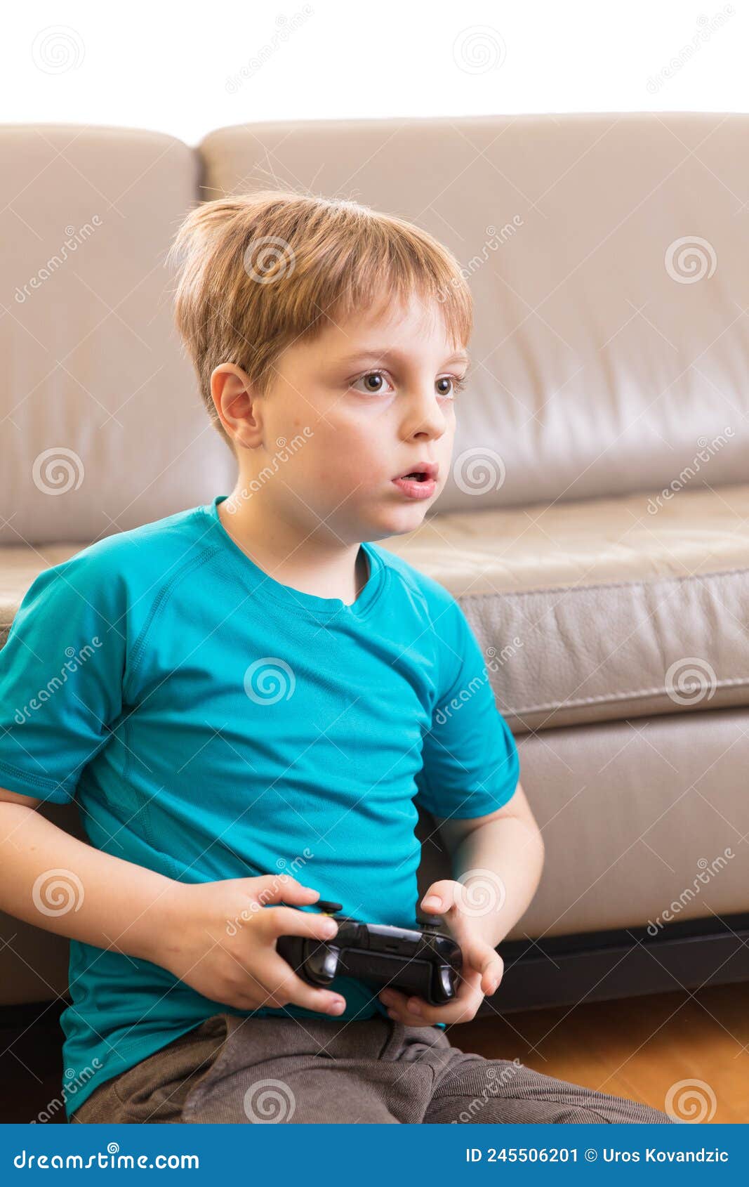 Boy playing video games stock image. Image of competitive - 245506201