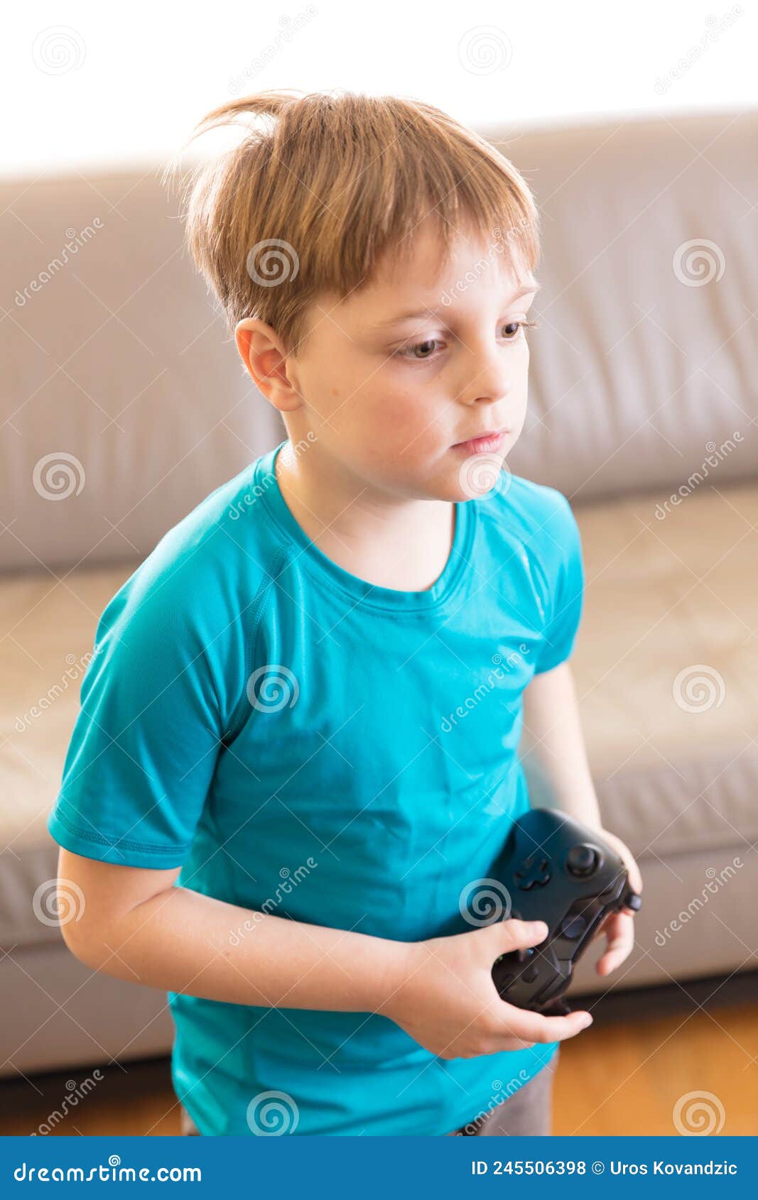 Boy playing video games stock photo. Image of game, computer - 245506398