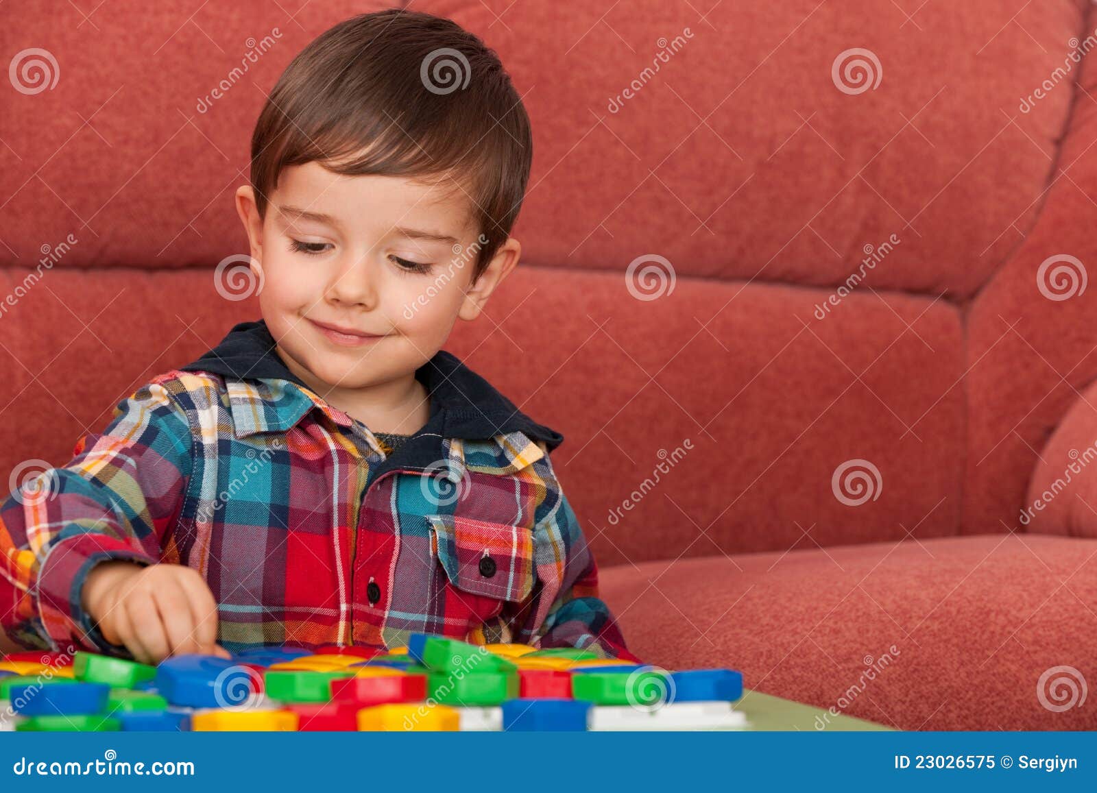 Little Boy Playing at the Table Stock Image - Image of pensive ...