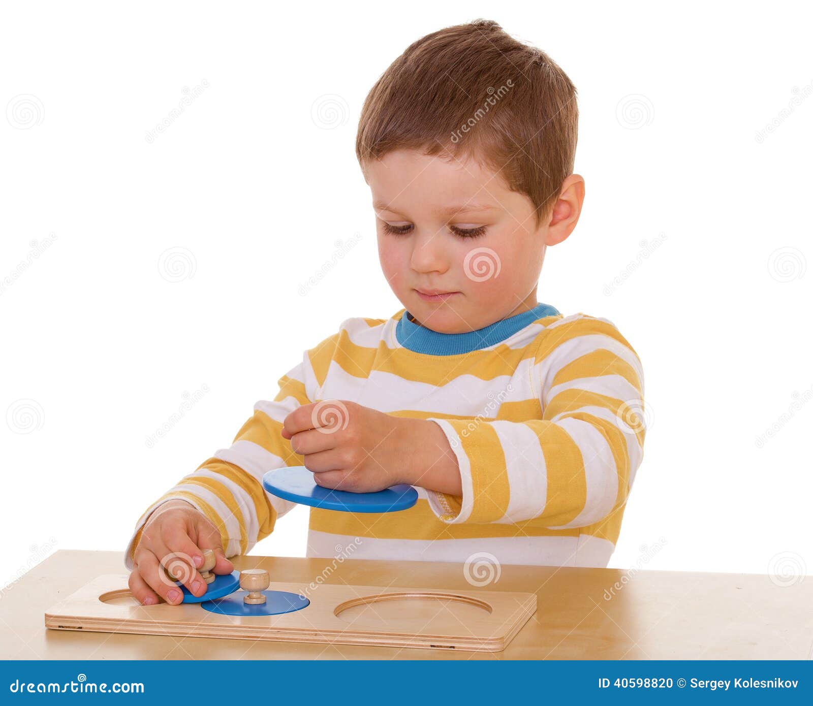 Little Boy Playing at the Table Stock Photo - Image of focused, male ...
