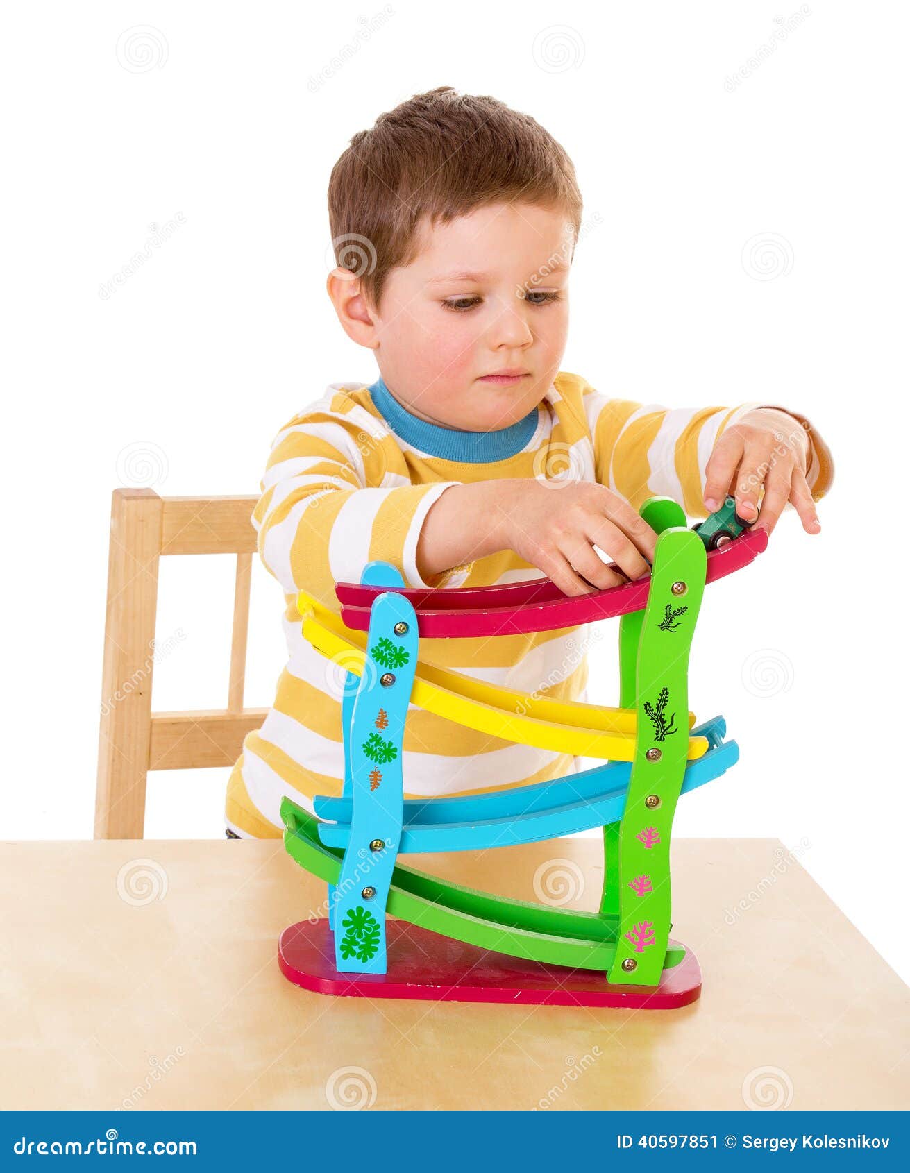 Little Boy Playing at the Table Stock Image - Image of focused, single ...