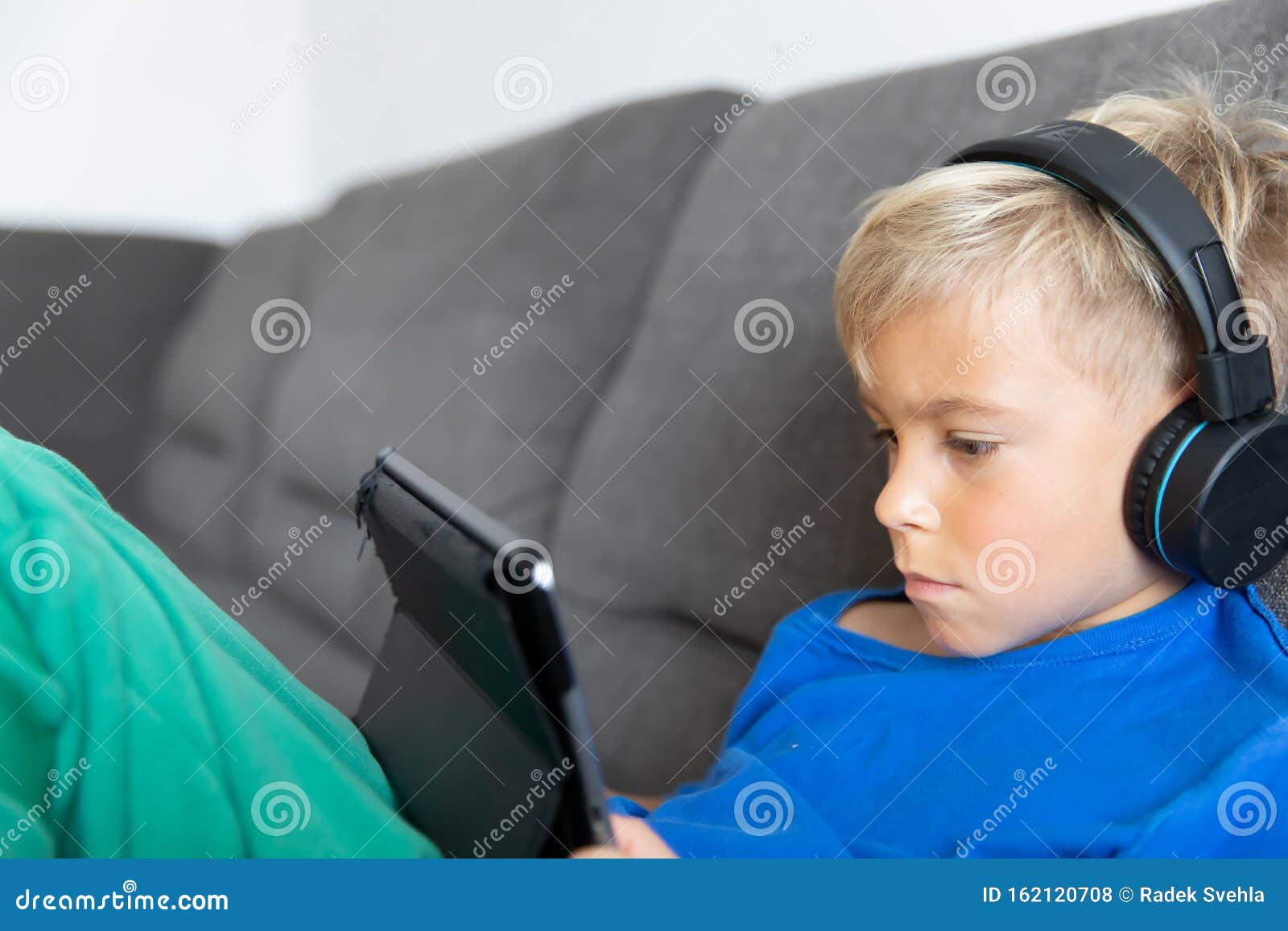 Little Boy Playing on Tablet Stock Photo - Image of childhood ...