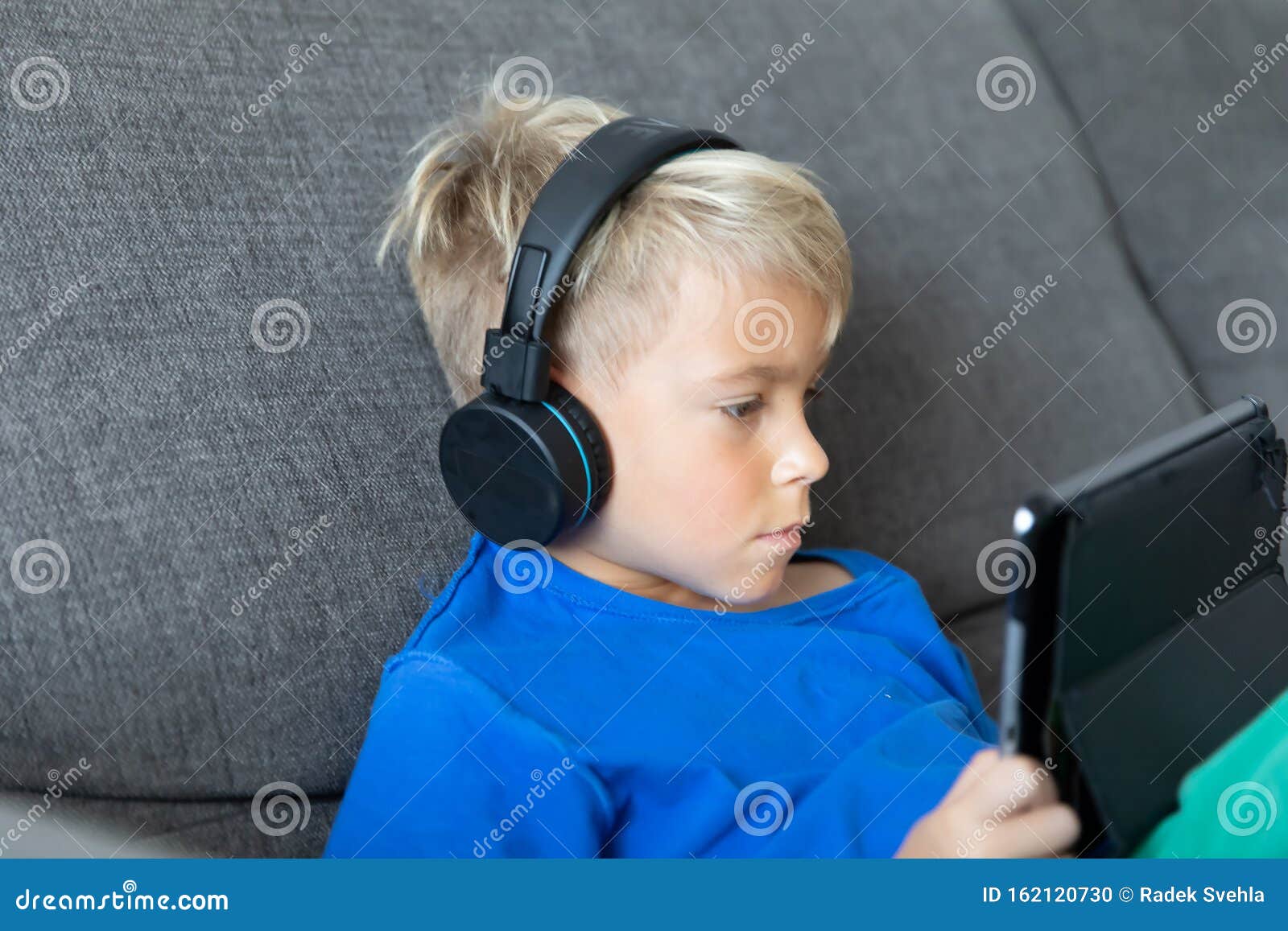 Little Boy Playing on Tablet Stock Photo - Image of close, education ...