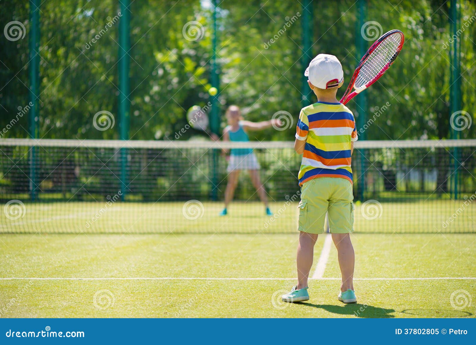 Little boy playing tennis stock image. Image of person - 37802805
