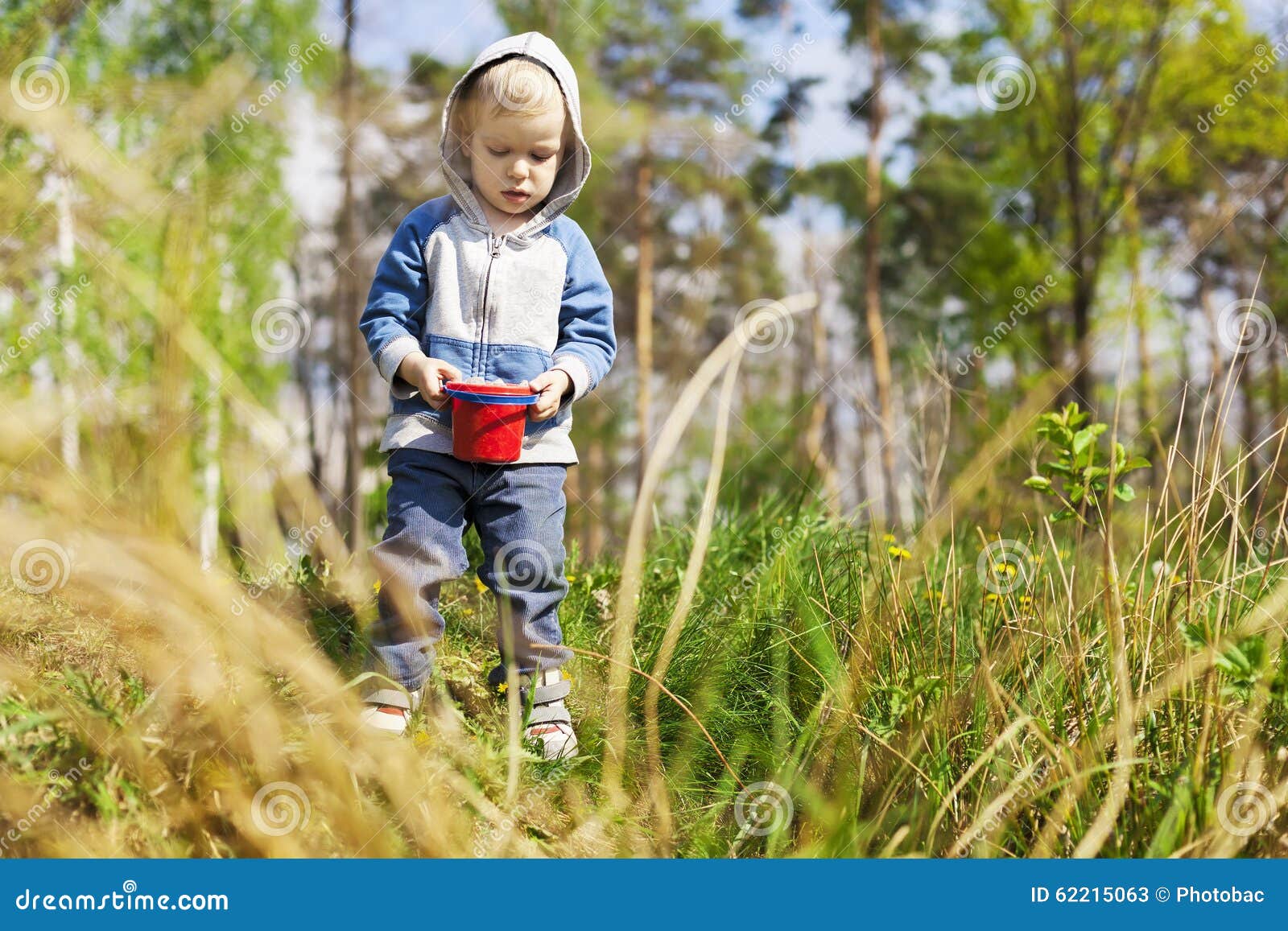 Little Boy Playing with Toy Bucket Stock Image - Image of natural, male ...