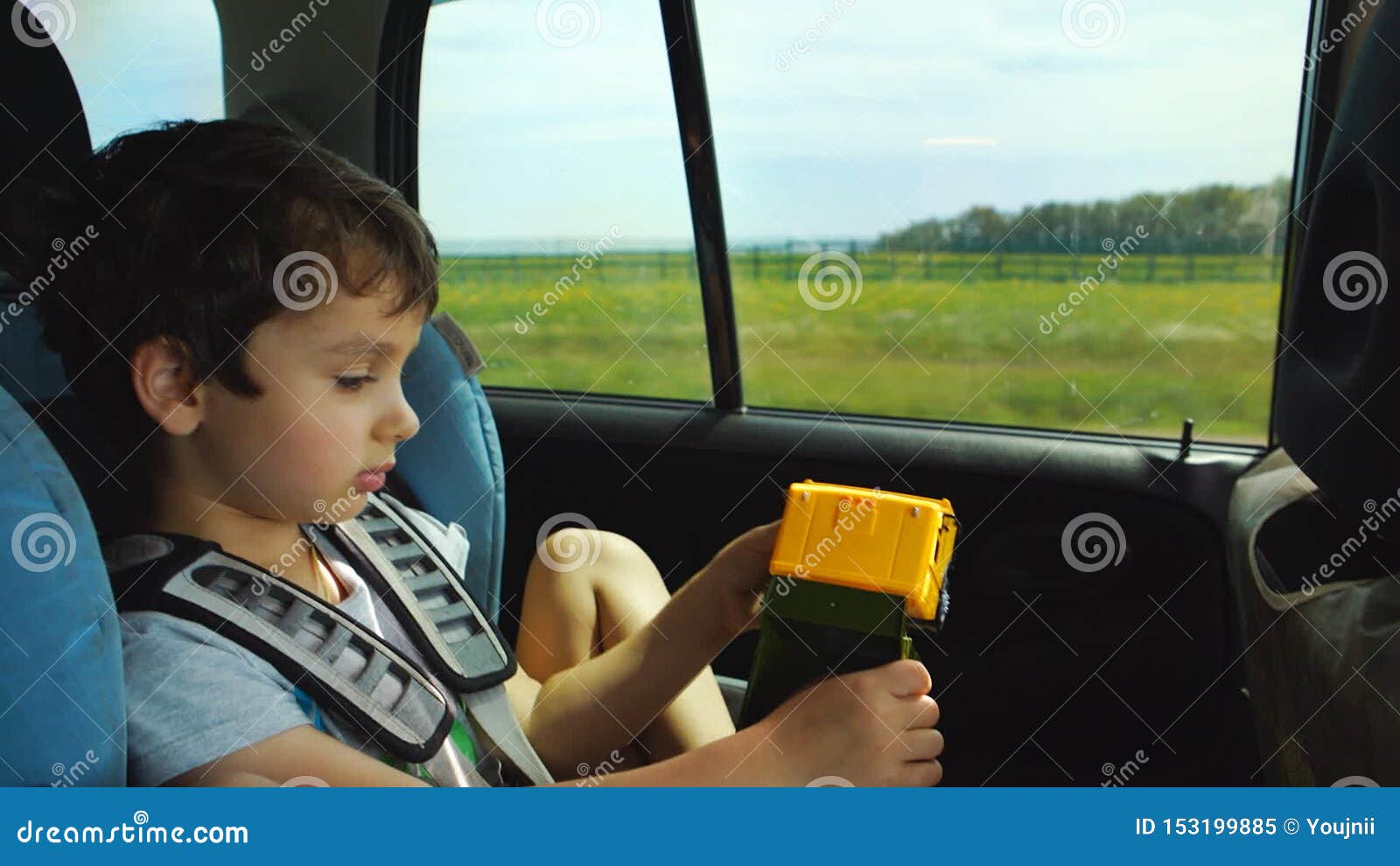 Little Boy Playing with the Toy in the Moving Car Stock Video - Video ...