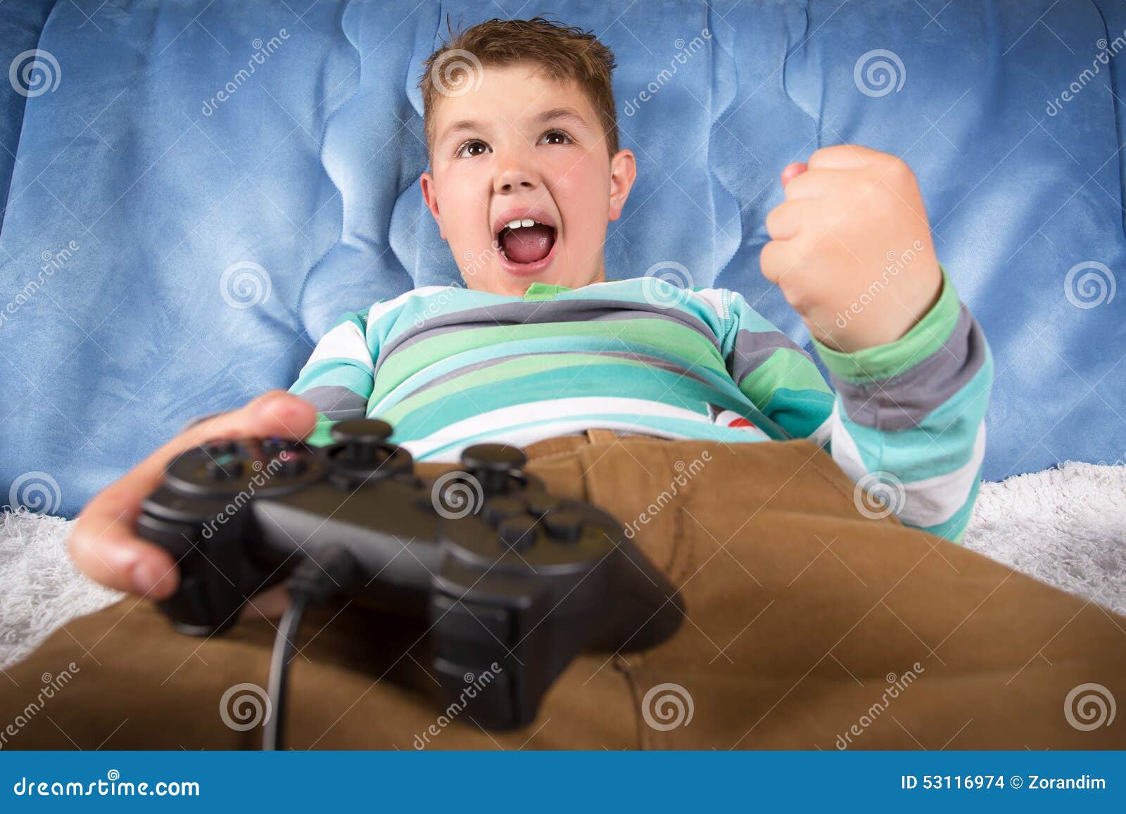 Little Boy Playing Video Games Stock Photo - Image of happy, emotion ...