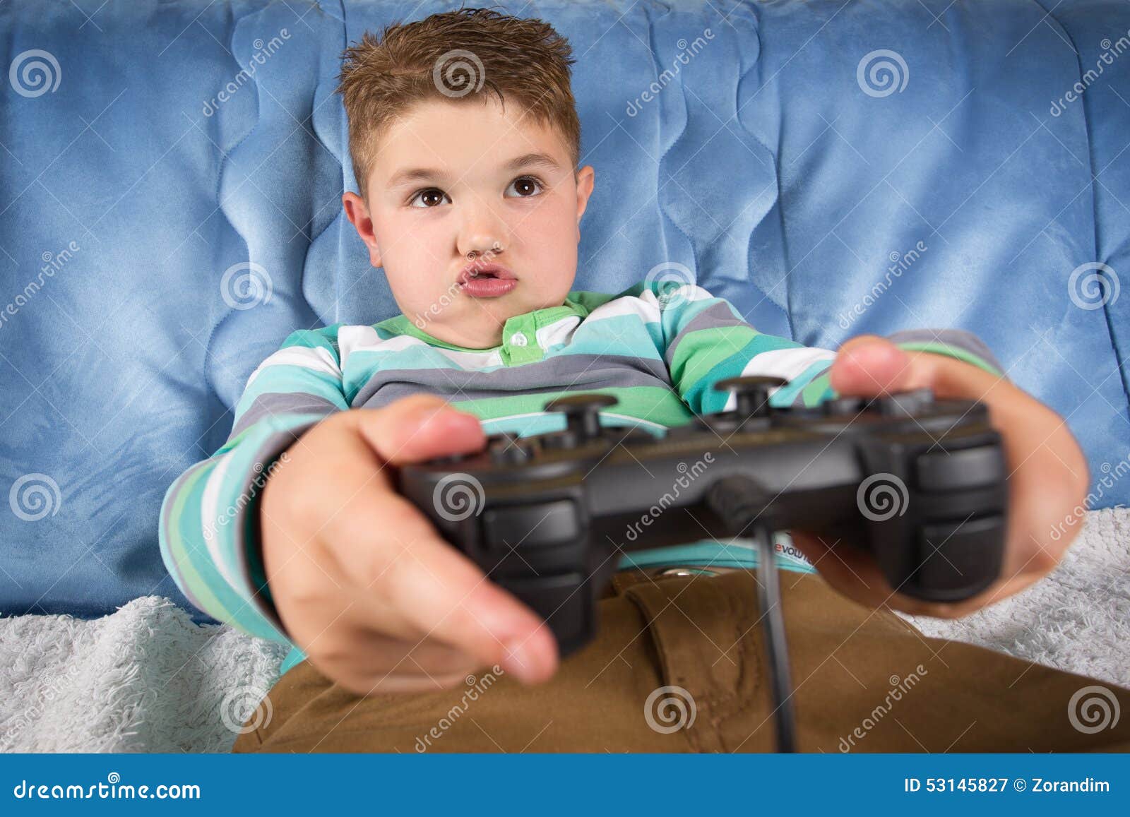 Little Boy Playing Video Games Stock Image - Image of handheld ...