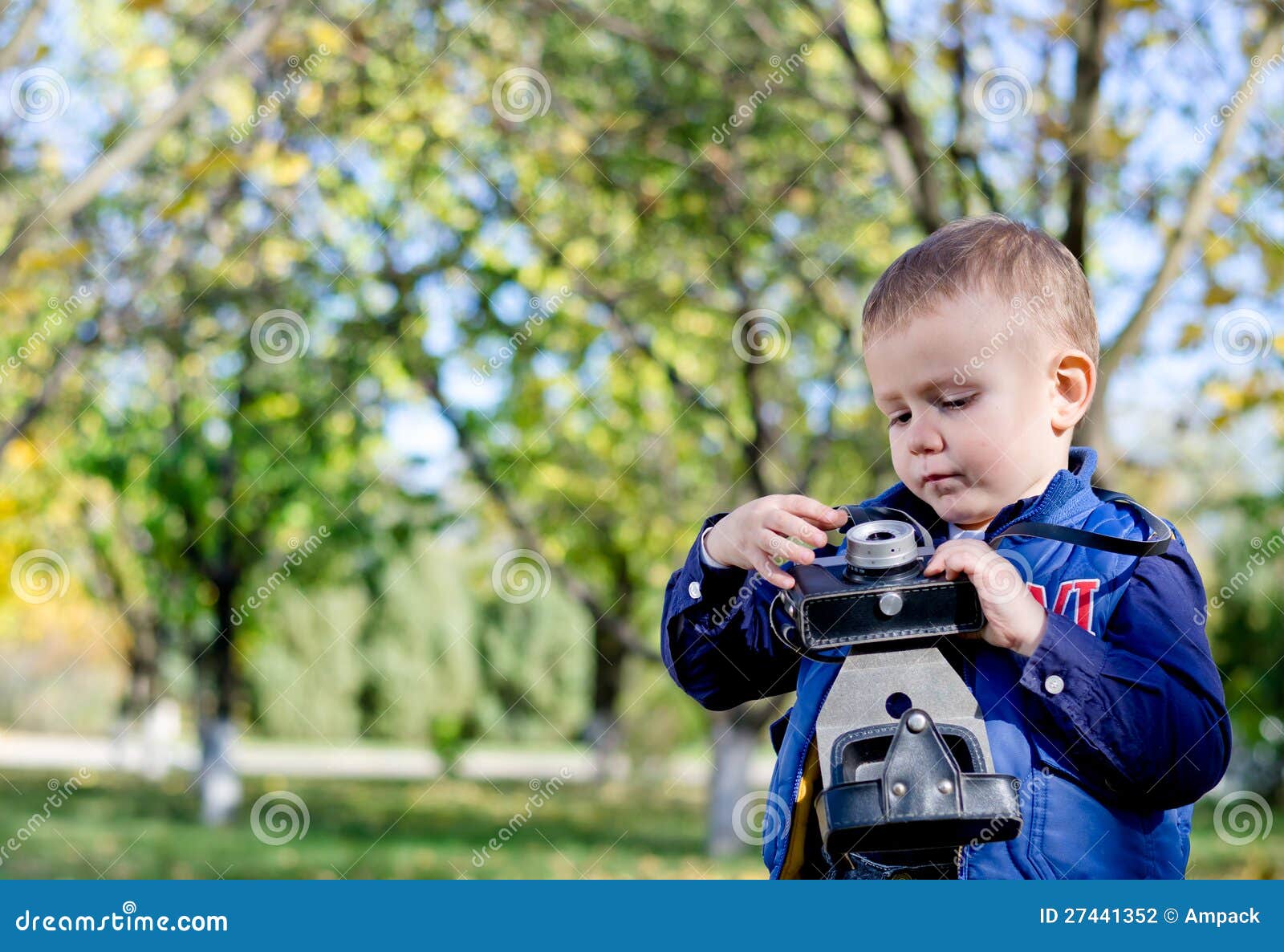 Little Boy Playing with a Vintage Camera Stock Photo - Image of ...