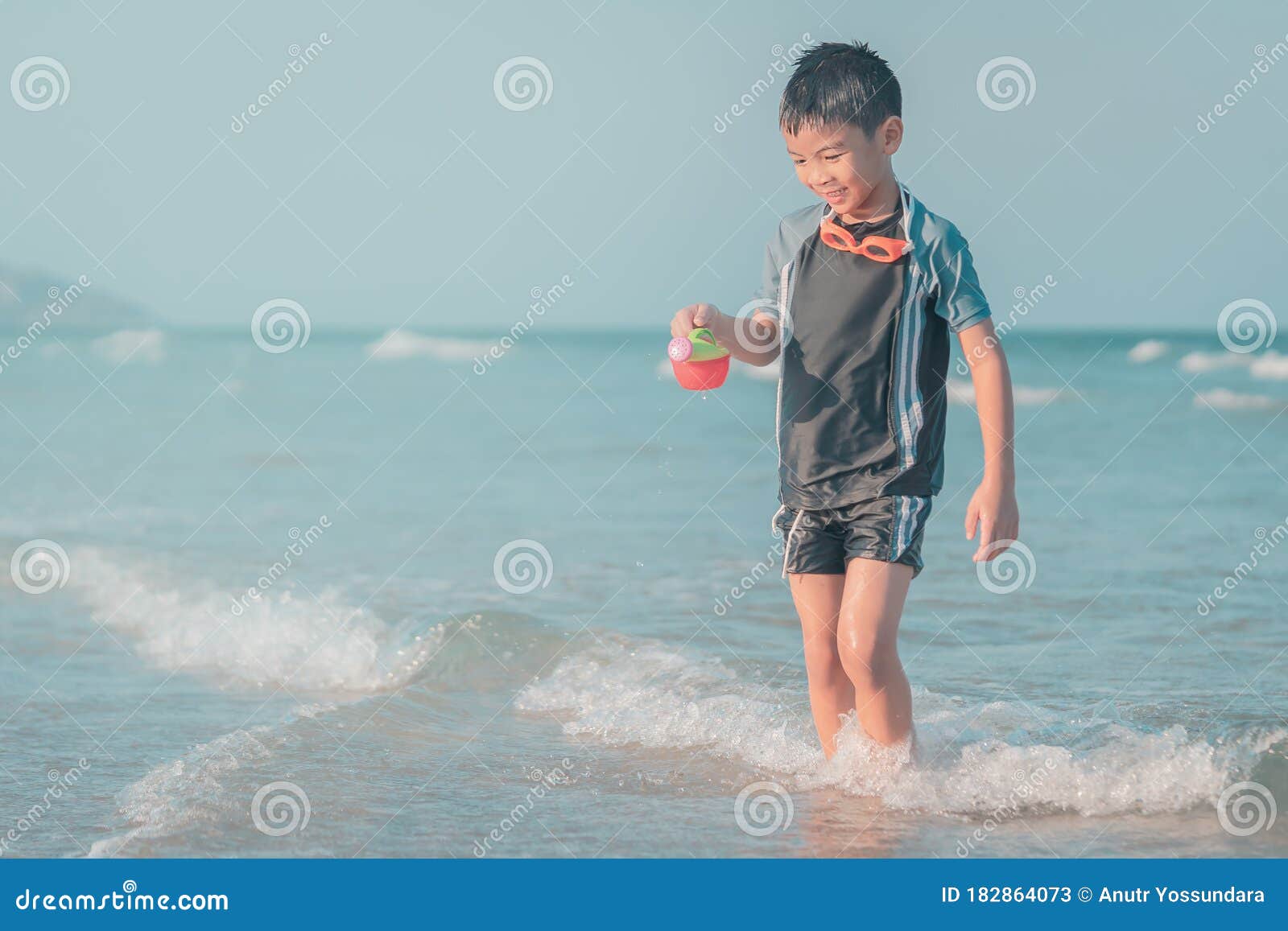 Little Boy Playing with Wave and Sand on Thailand Beach Stock Image ...