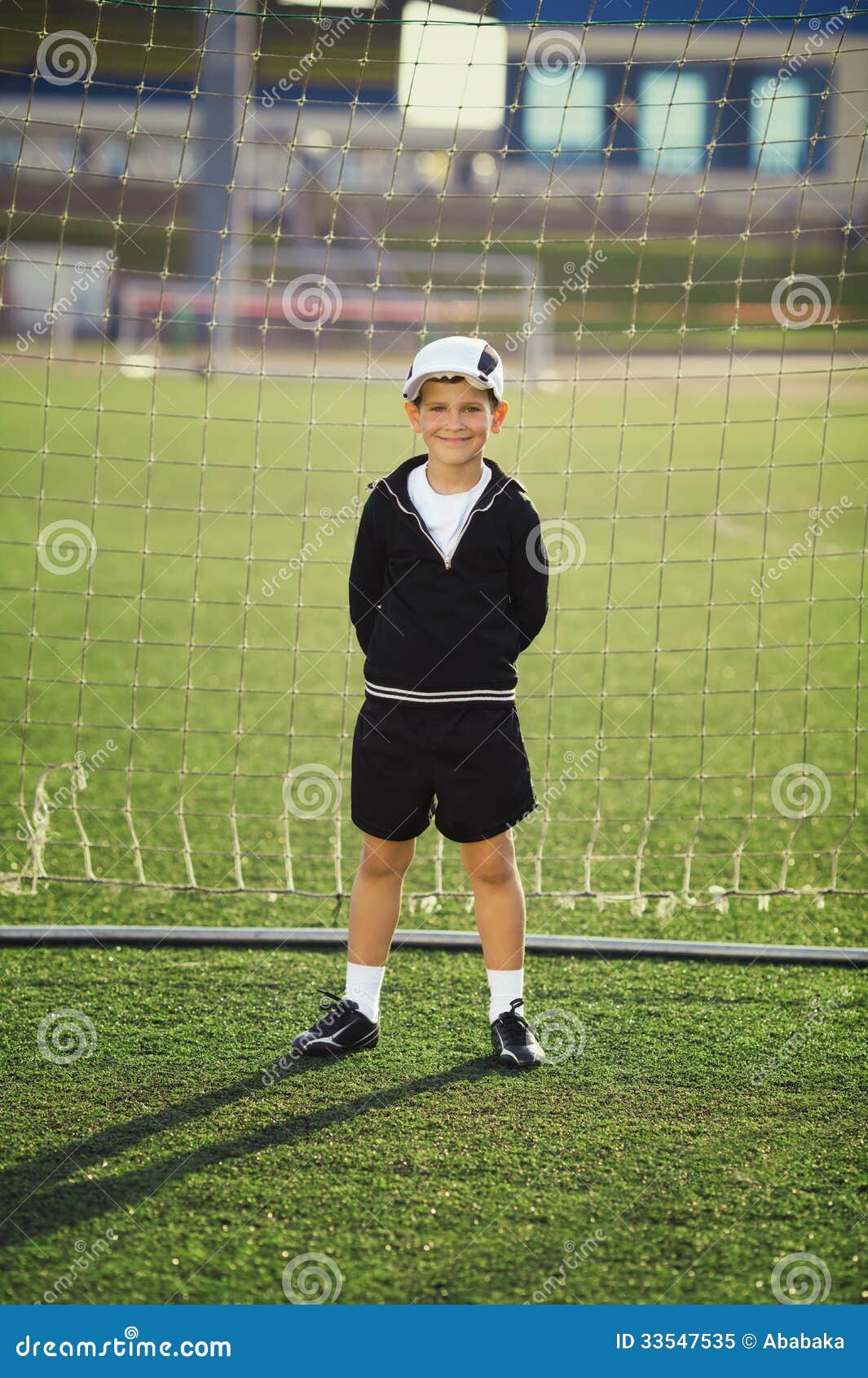 Little boy plays football stock image. Image of cute - 33547535