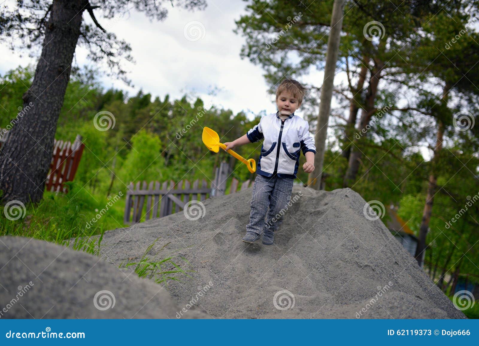 Little Boy Plays on Heap of Crushed Stone Stock Image - Image of ground ...