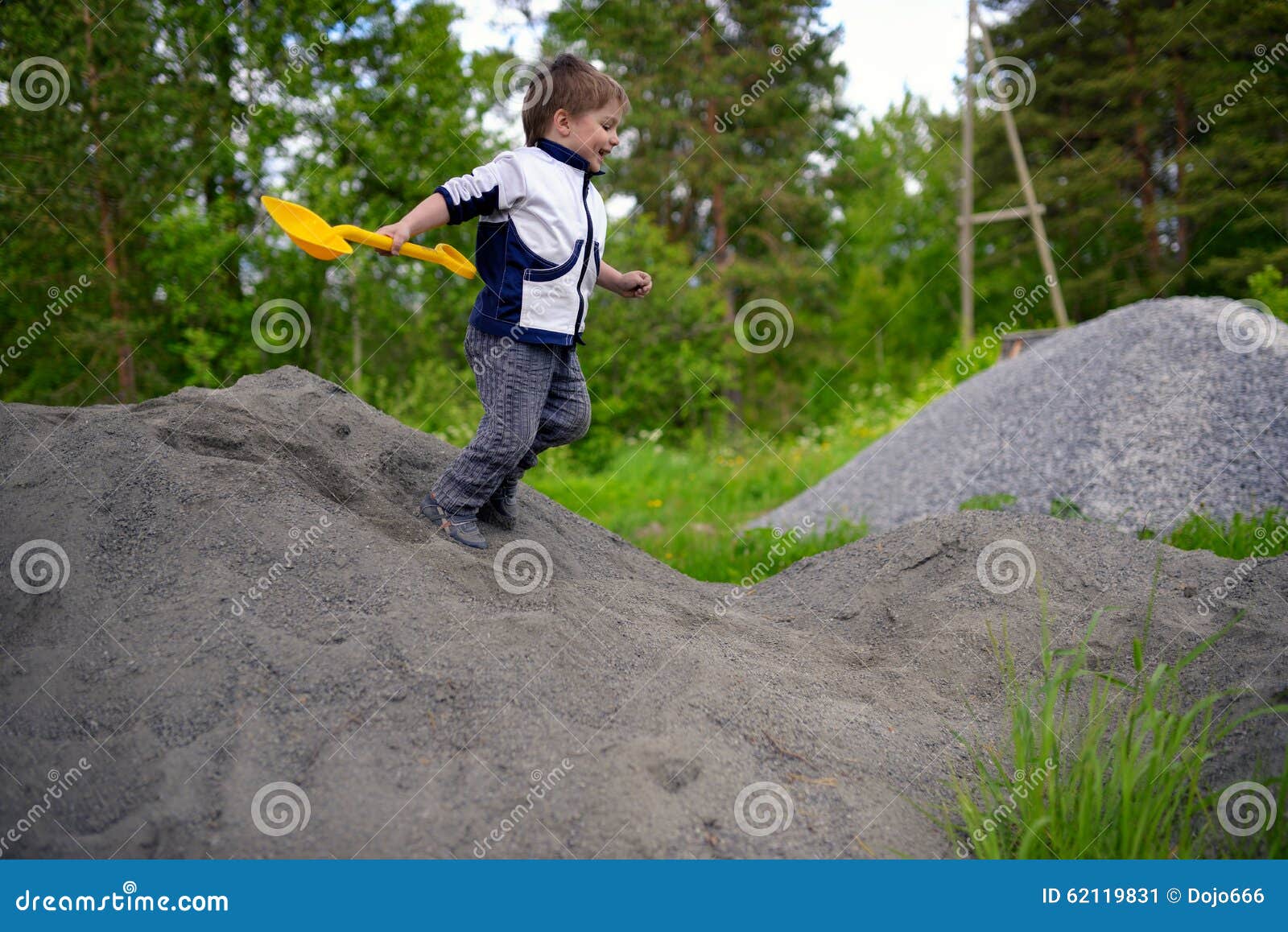 Little Boy Plays on Heap of Crushed Stone Stock Image - Image of ...