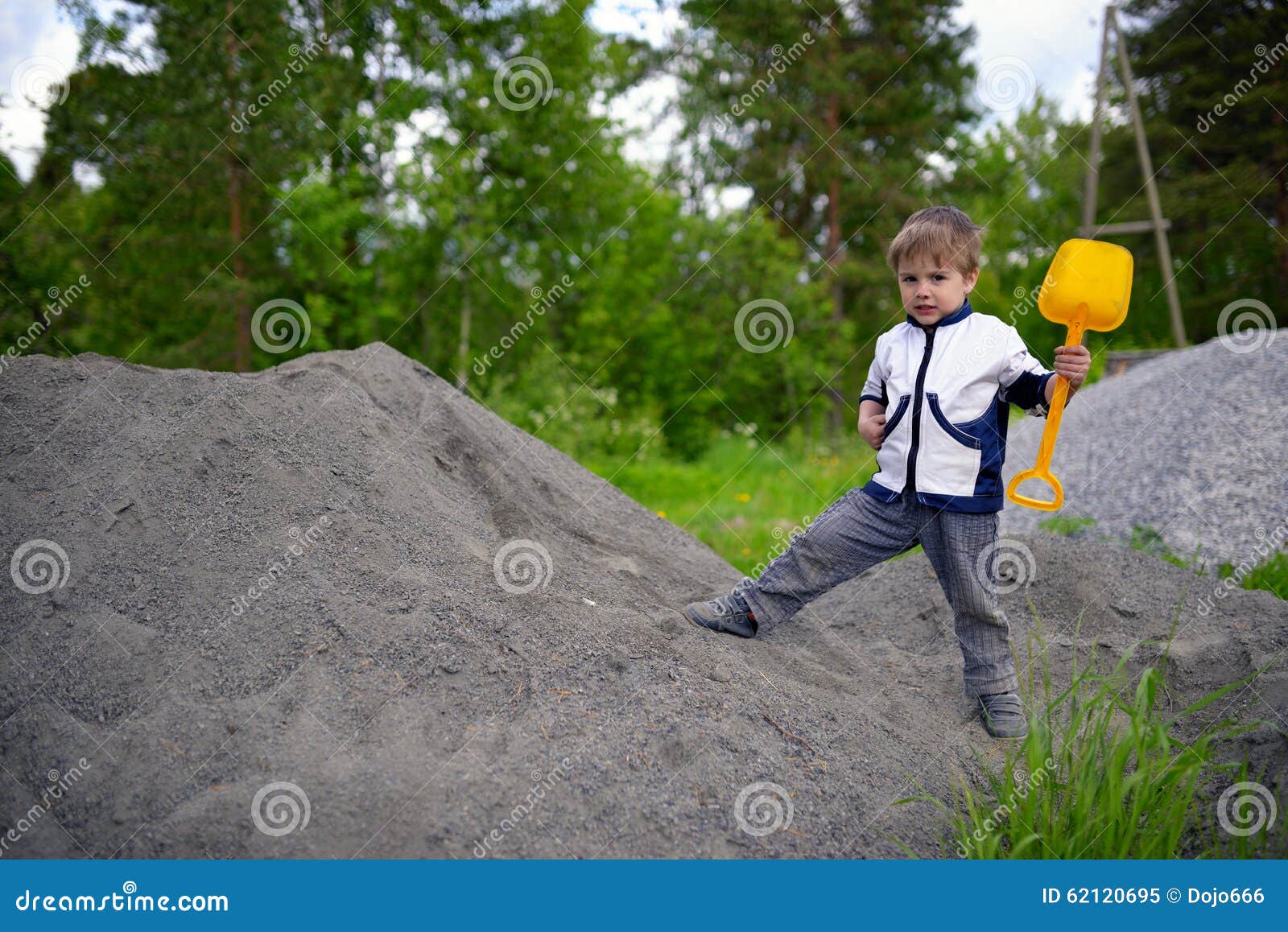 Little Boy Plays on Heap of Crushed Stone Stock Image - Image of ground ...