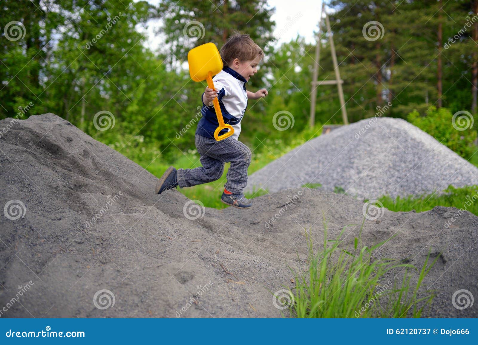 Little Boy Plays on Heap of Crushed Stone Stock Image - Image of ...