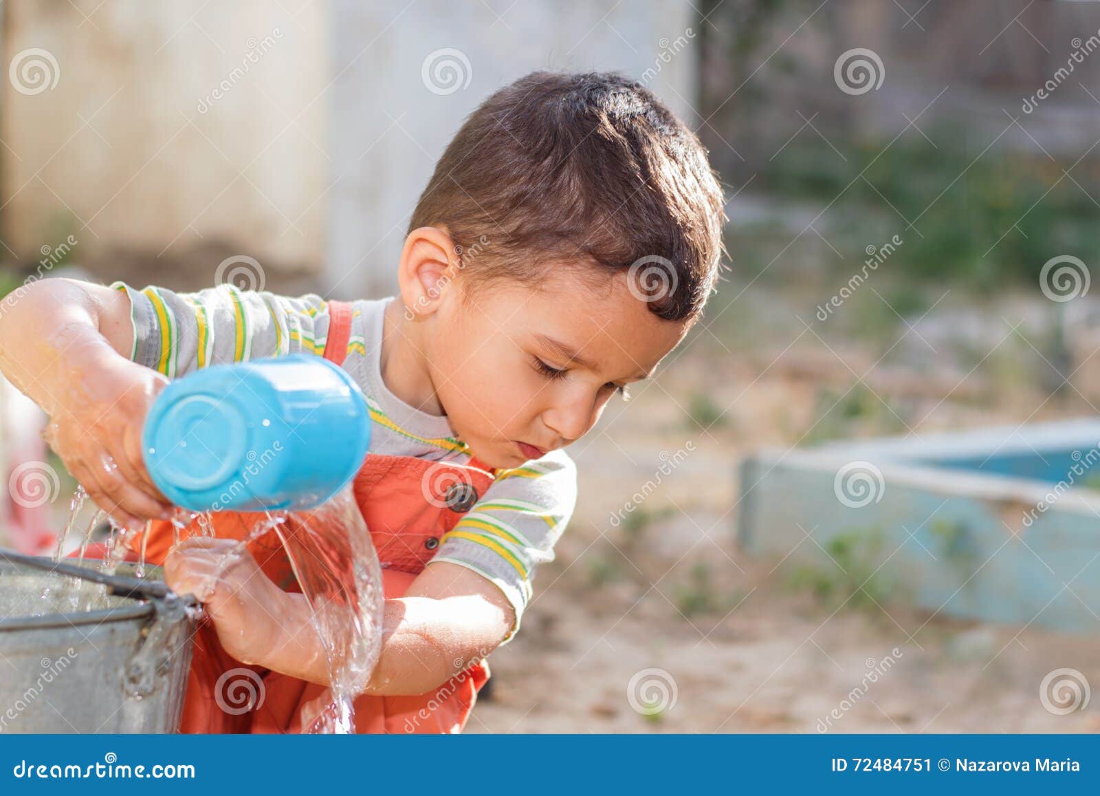 Little Boy Plays with Water Stock Image - Image of caucasian, heat ...