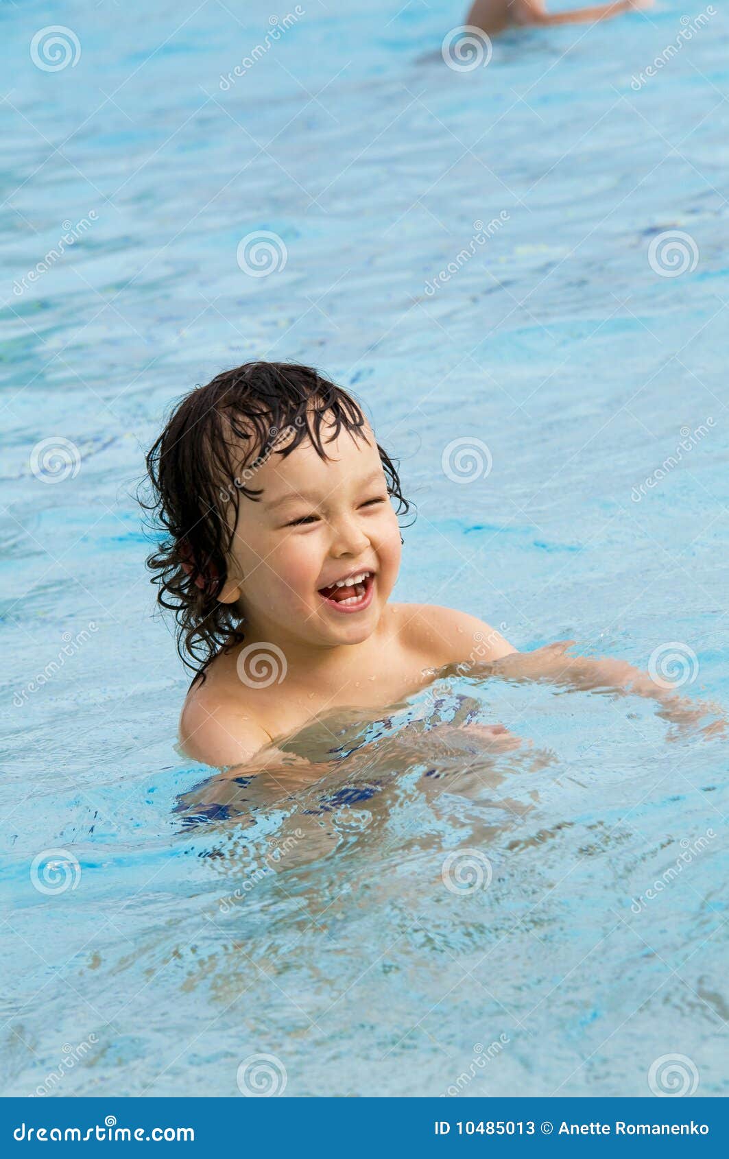 Little boy in poll. stock image. Image of blue, splashing - 10485013