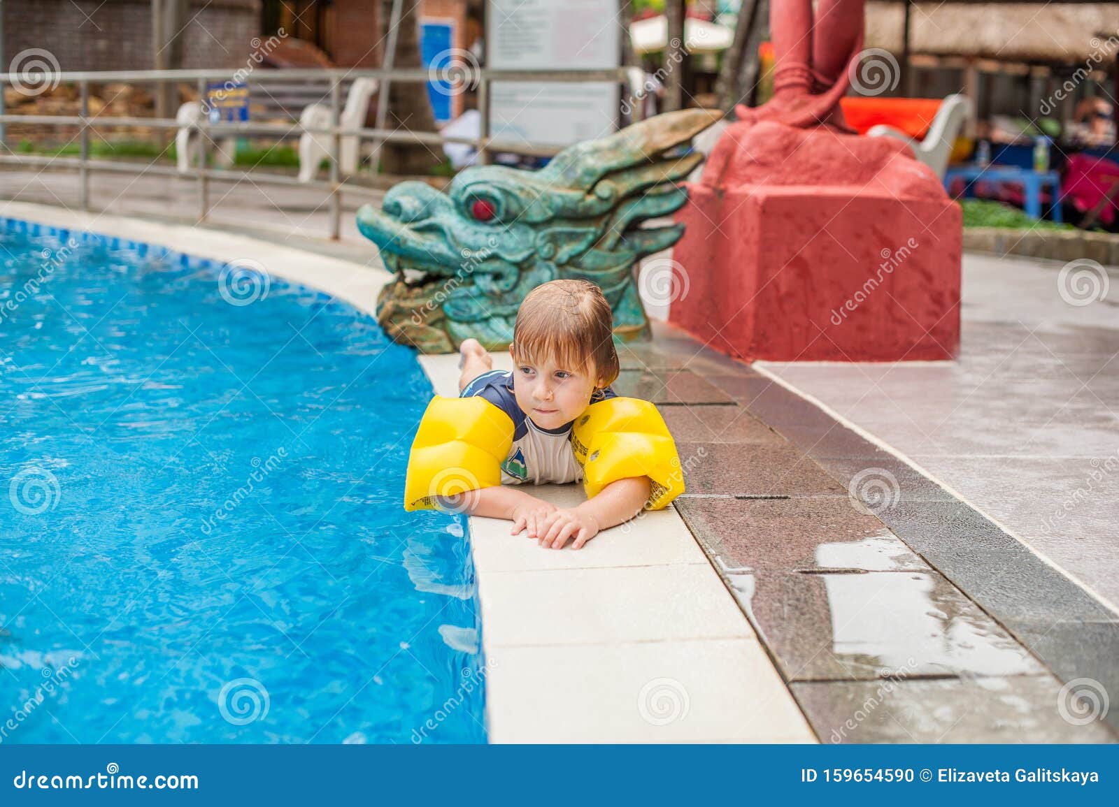 LITTLE BOY in the POOL and SMILING Stock Photo - Image of face, aqua ...