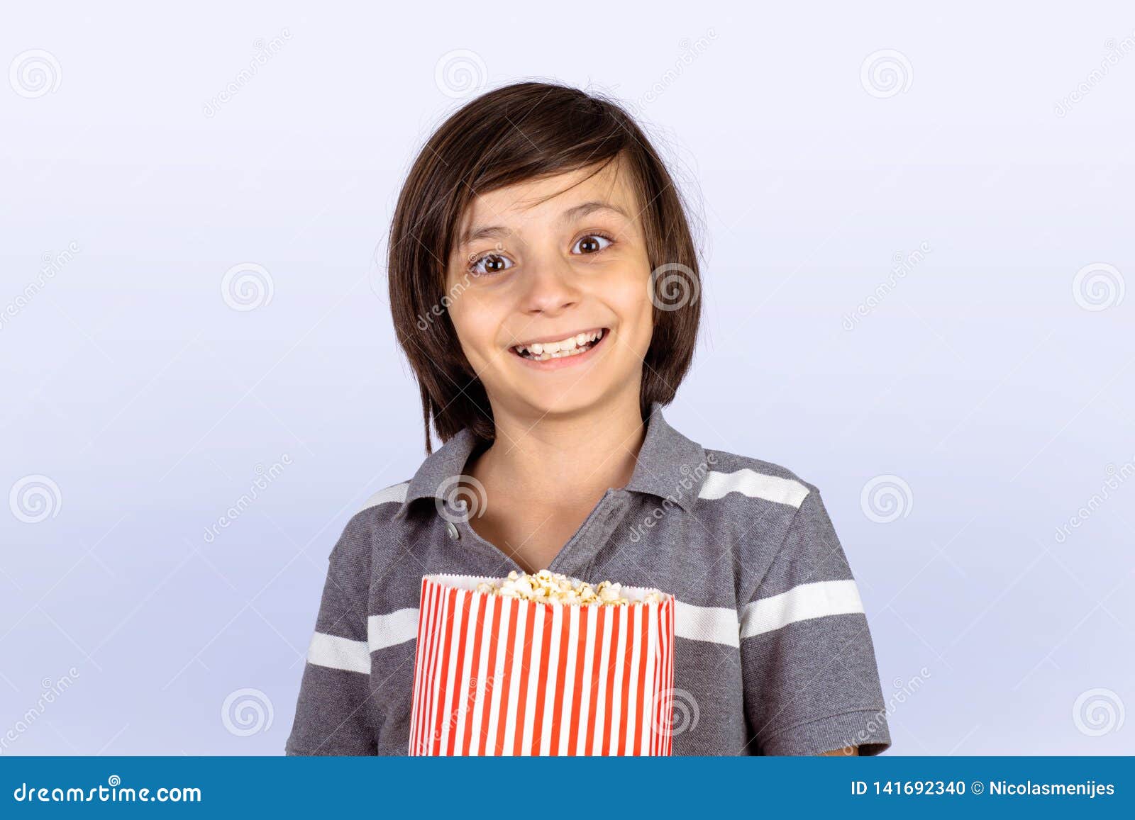 Little boy with popcorn stock photo. Image of popcorn - 141692340