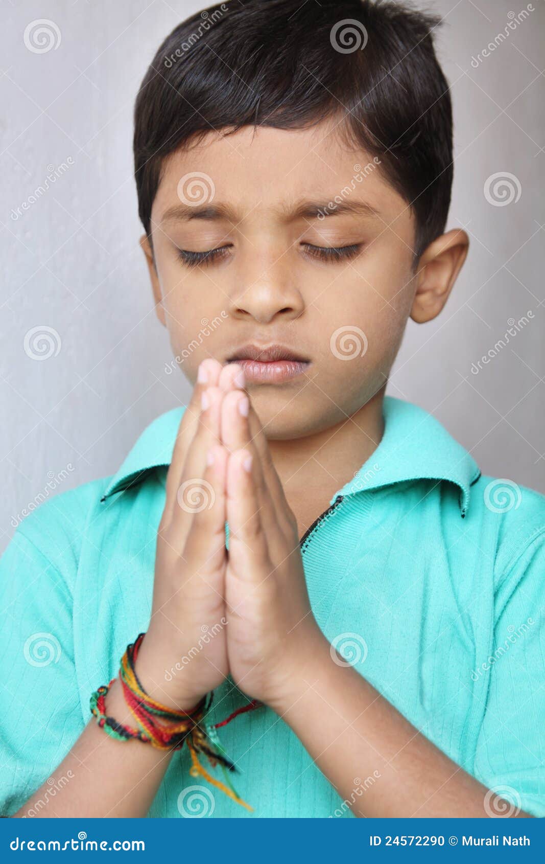 Little Boy Praying stock photo. Image of devoted, hand - 24572290