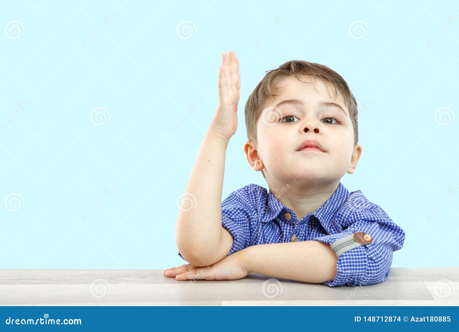 Little Boy of Preschool Age Raises His Hand To Answer the Question or ... Little Boy of Preschool Age Raises His Hand To Answer the Question or ...