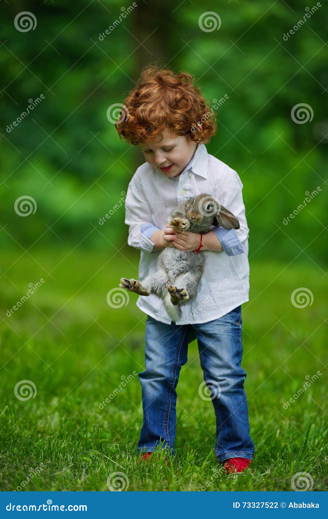 Little Boy with Rabbit on Grass Stock Photo - Image of little, person ...
