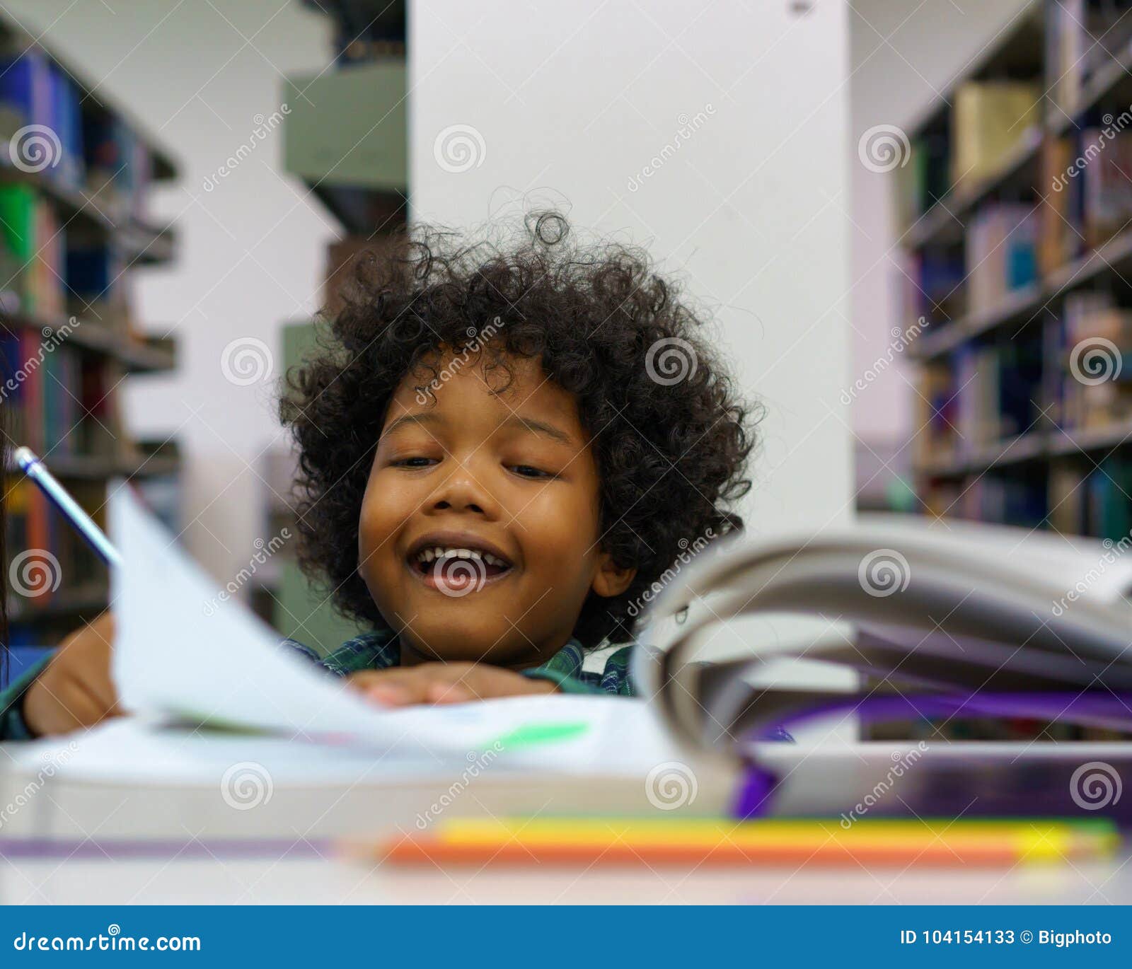 Little Boy Reading Book in the Library Stock Image - Image of book ...