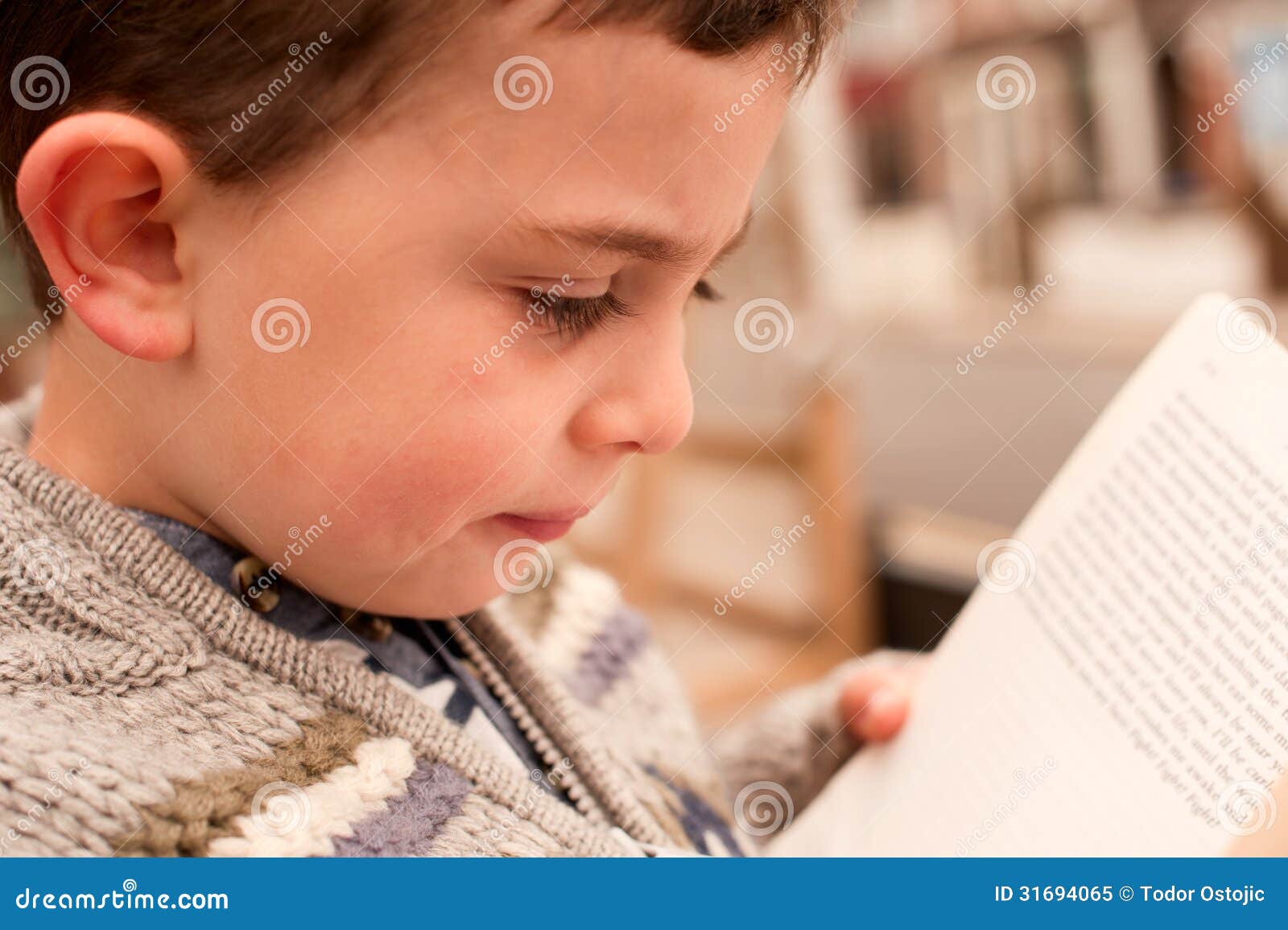 Little boy reading a book stock image. Image of little - 31694065