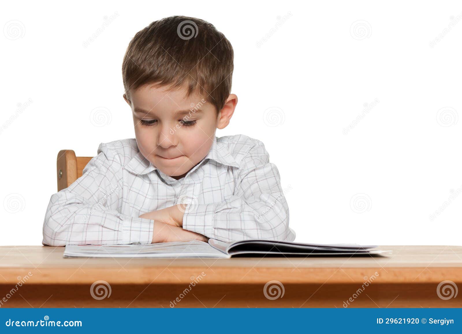 Little Boy Reads at the Desk Stock Photo - Image of children, learn ...