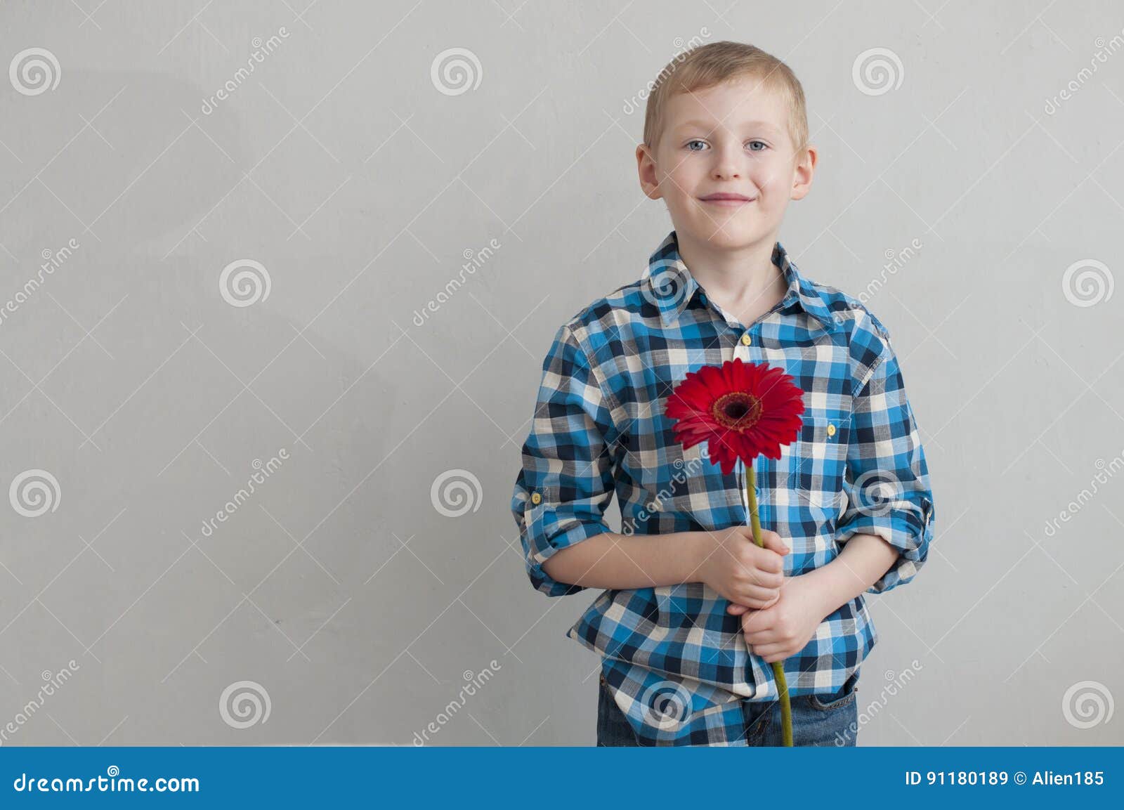 Little boy with red flower stock image. Image of date - 91180189