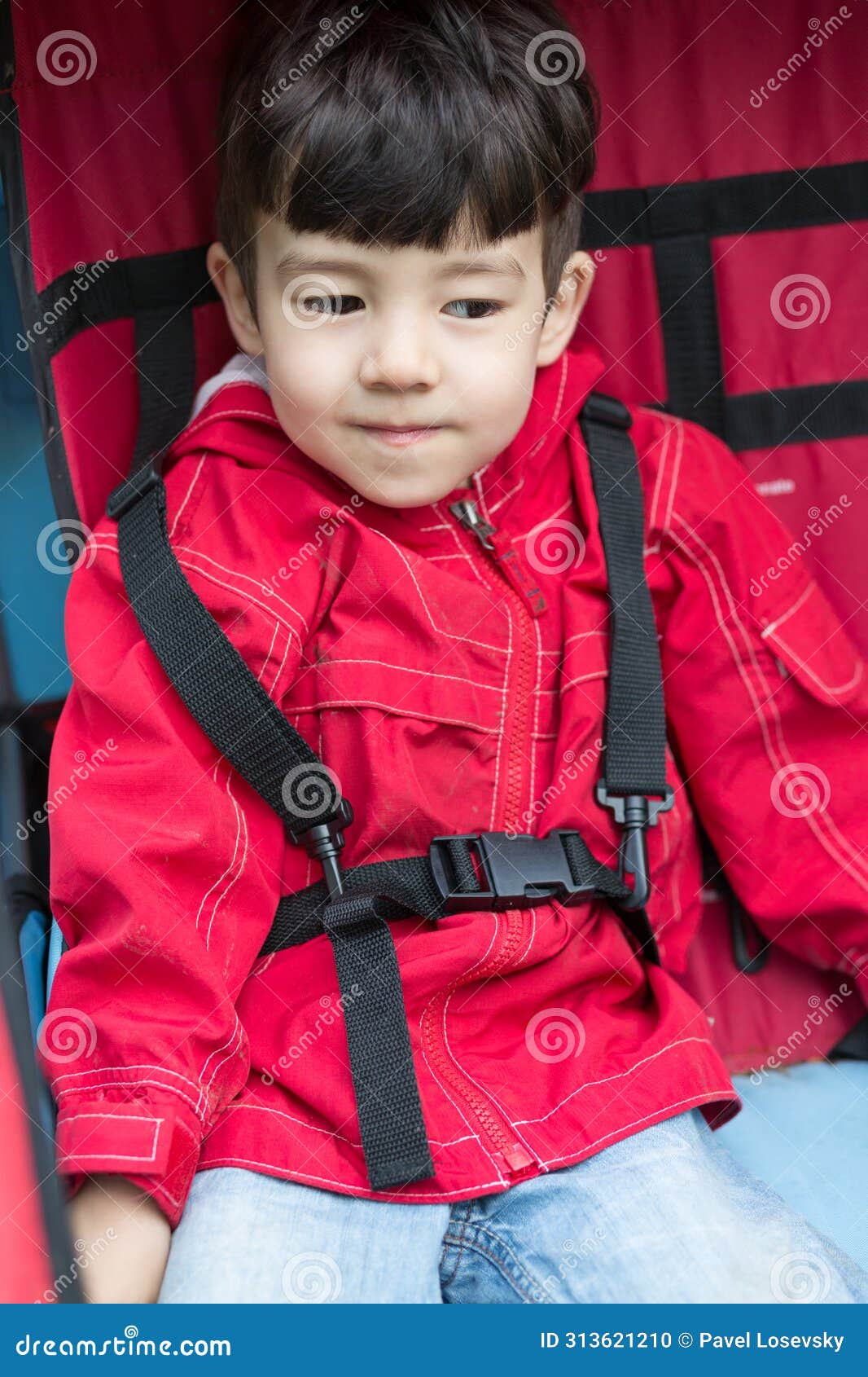 A Little Boy in a Red Jacket Wearing Stock Photo - Image of jeans ...