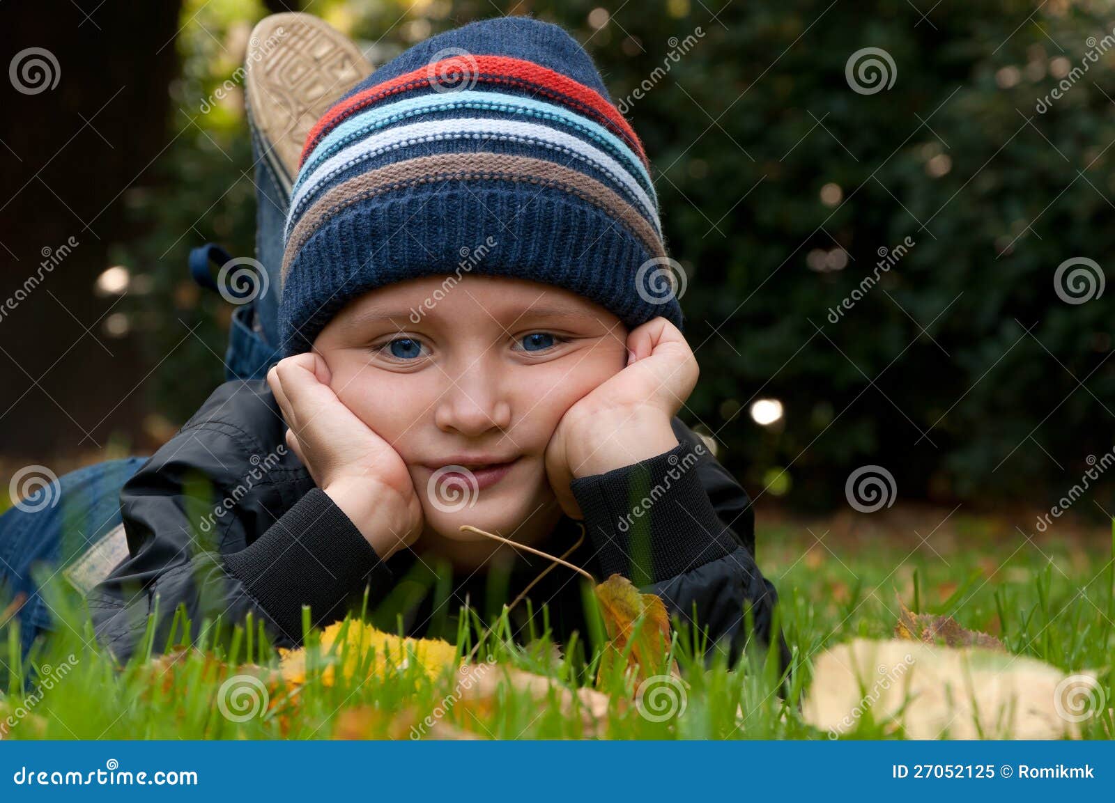 Little Boy Relaxing in the Park Stock Image - Image of nature, fall ...