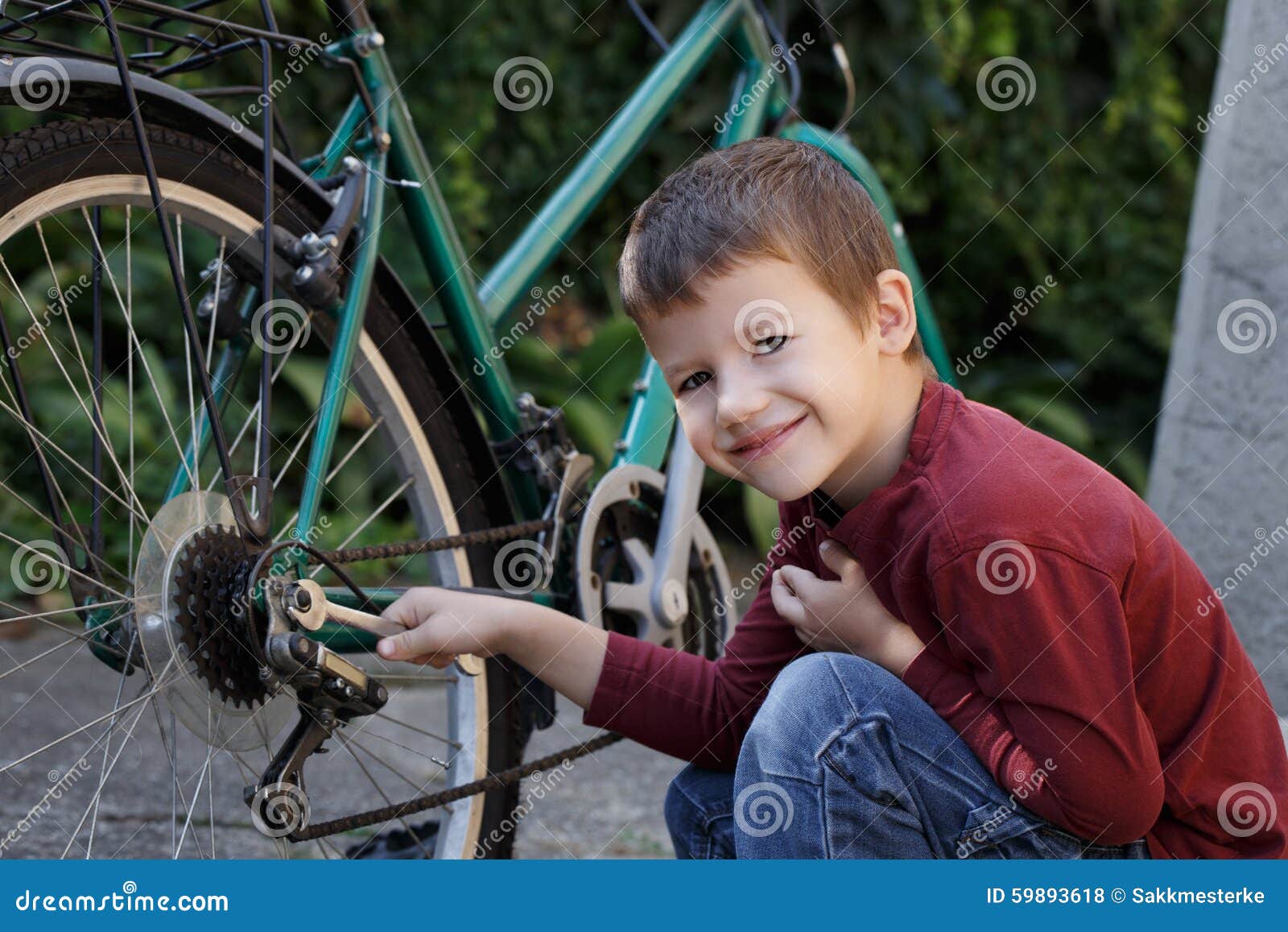 Little Boy Repairing Bicycle Stock Photo - Image of double, wheel: 59893618