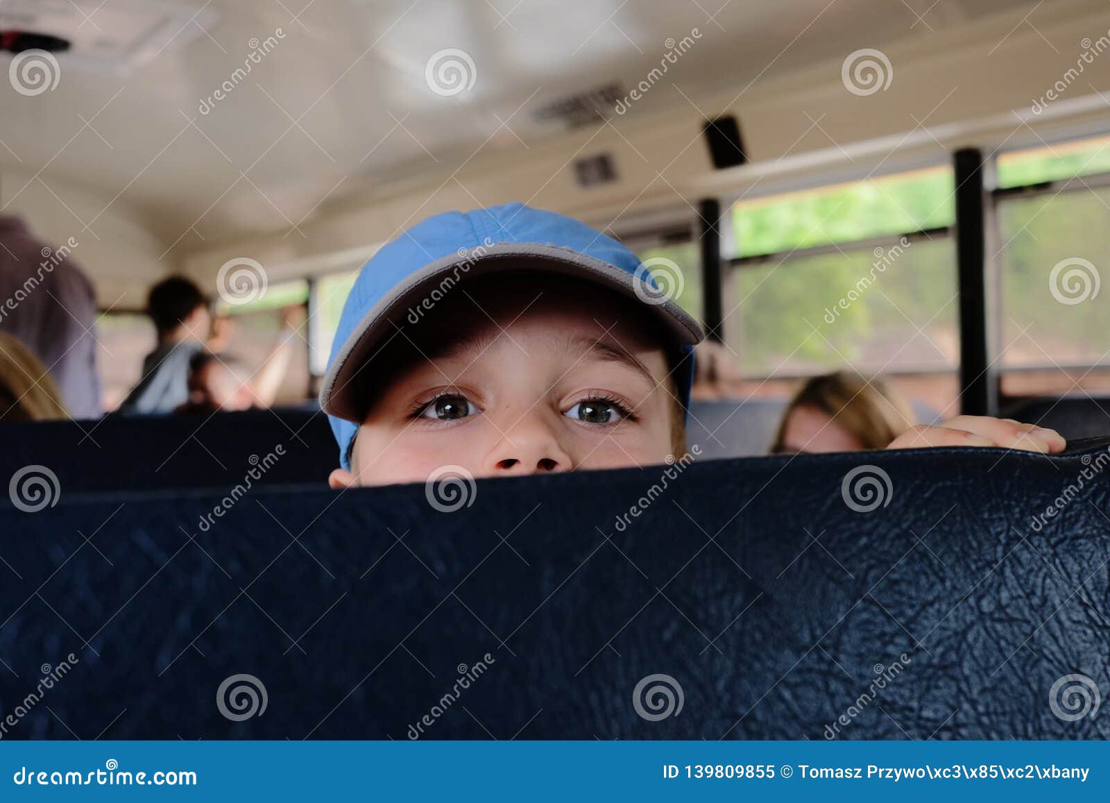 A Little Boy is Riding a Bus Stock Image - Image of child, eating ...