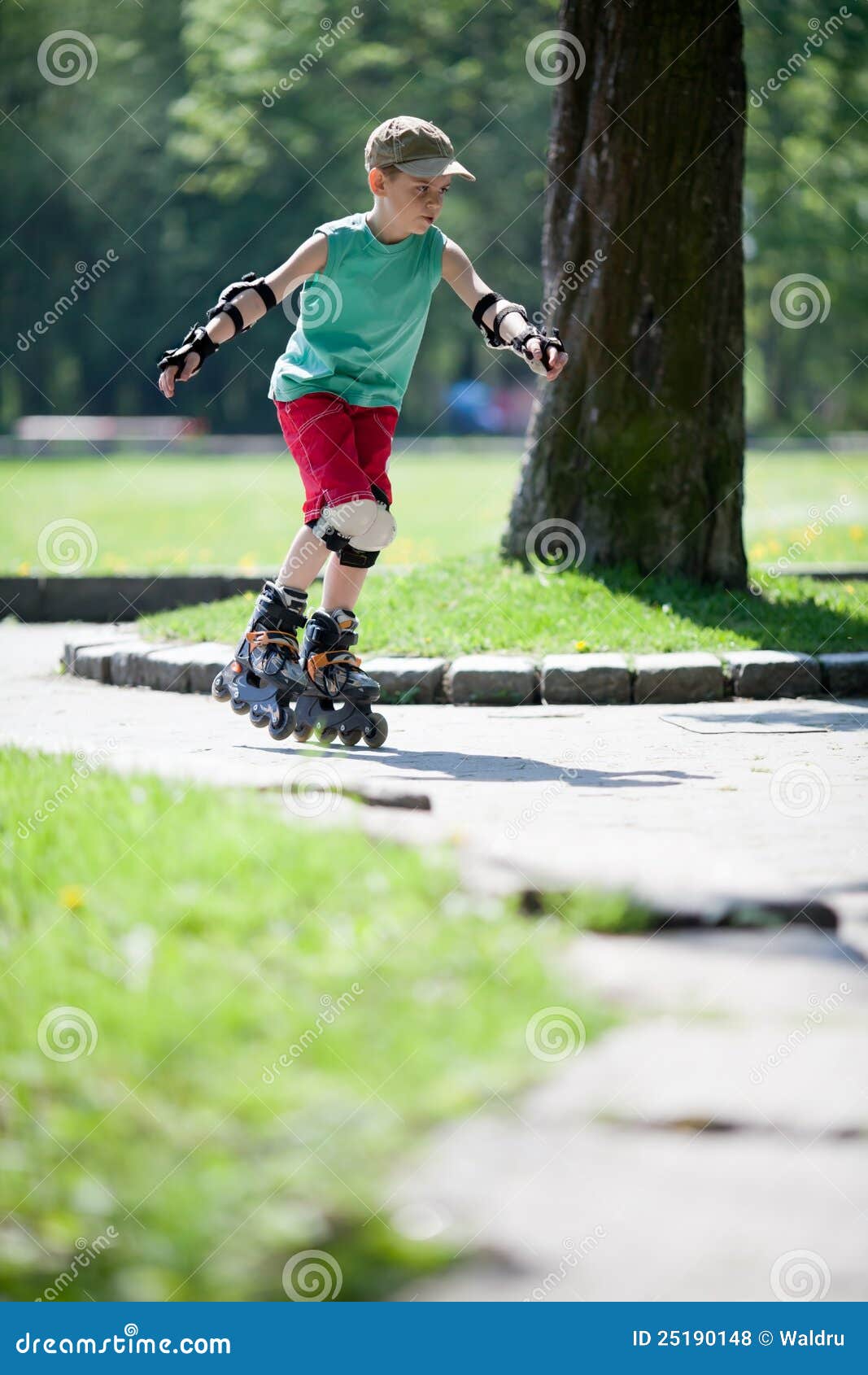 Little boy on rollerblades stock photo. Image of playing - 25190148